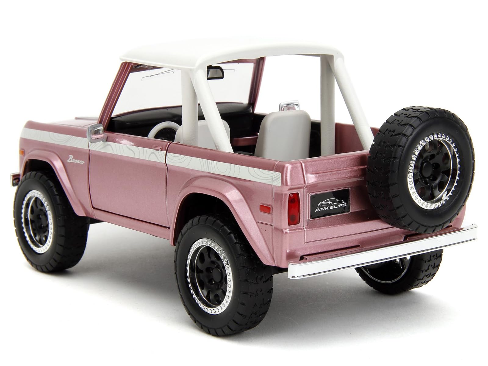1973 Bronco Pink Metallic with White Top and Graphics Pink Slips Series 1/24 Diecast Model Car by Jada 34896