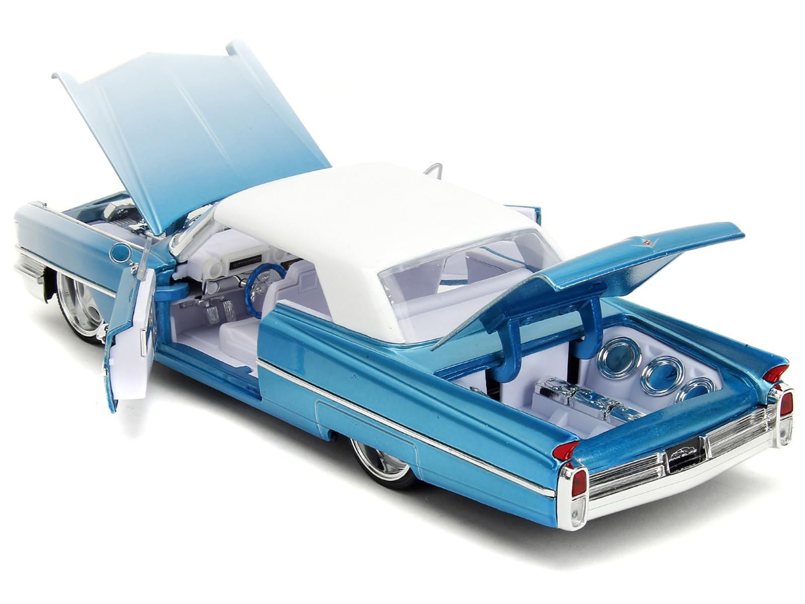 1963 Coupe DeVille Blue Metallic and White Gradient with White Top and Interior Pink Slips Series 1/24 Diecast Model Car by Jada 34897