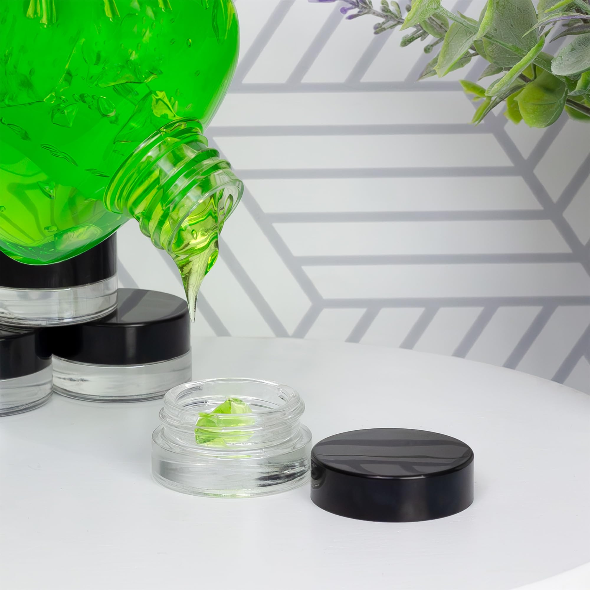 Cornucopia Brands 7-Milliliter Clear Glass Balm Jars (12-Pack); 1/4 oz Cosmetic Jars w/Lined Black Plastic Lids