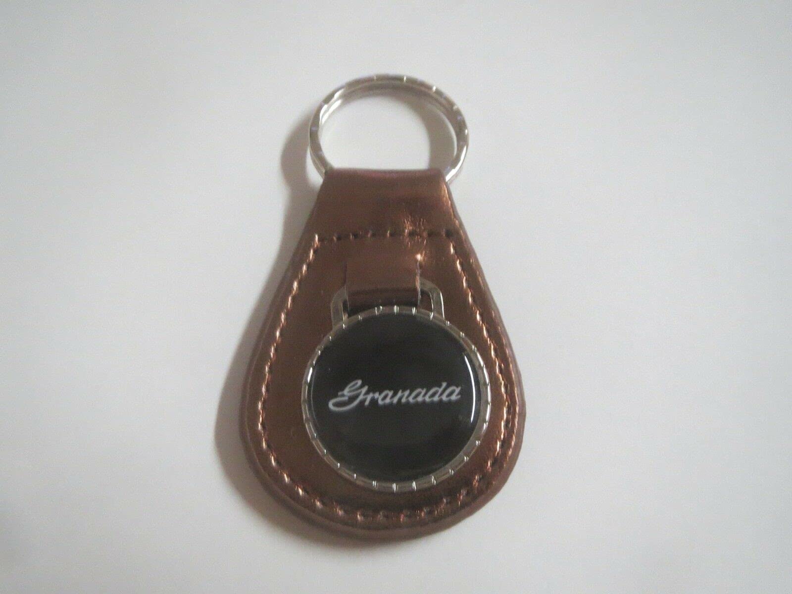 1975 1976 1977 1978 1979 1980 1981 1982 GRANADA SCRIPT LOGO LEATHER KEYCHAIN - GOLD