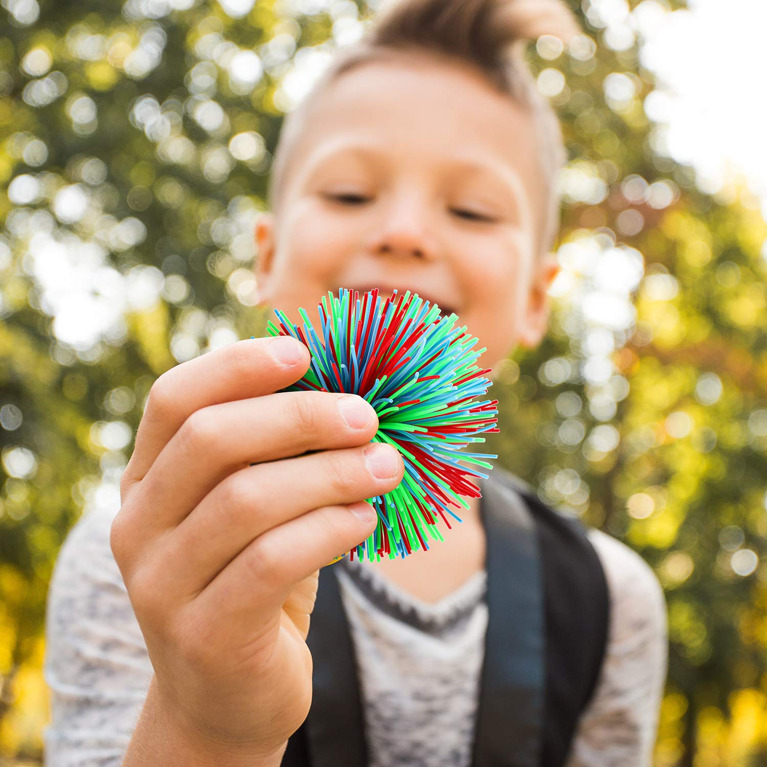 8 Pieces Monkey Stringy Balls Sensory Fidget Stringy Balls Soft Rainbow Pom Bouncy Stress Balls with Storage Bag, Multicolor (2.75 Inch 8 Pieces)