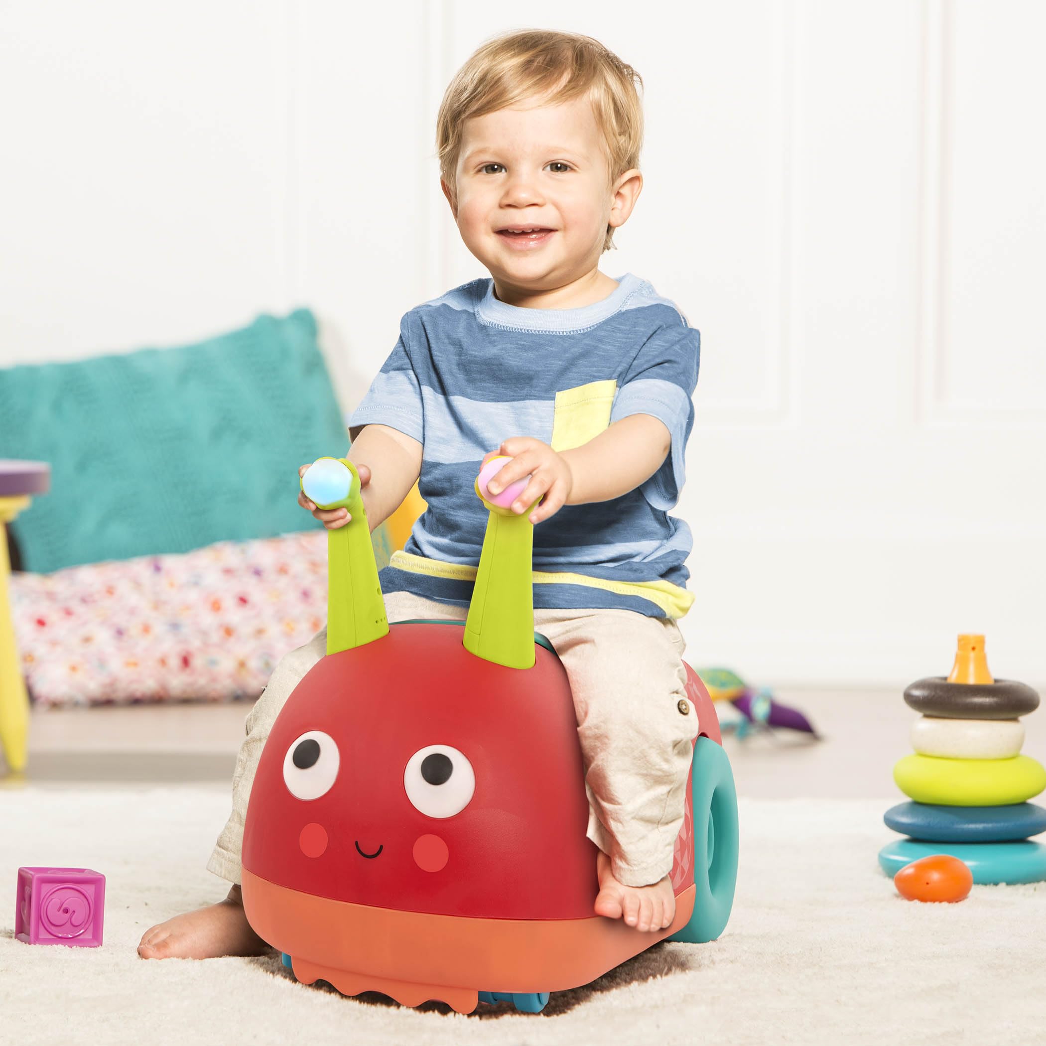 B. toys- Ladybuggy- Ride-On Toy with Lights & Sounds– Ladybug Ride On- Ergonomic Seat – 1 Year +