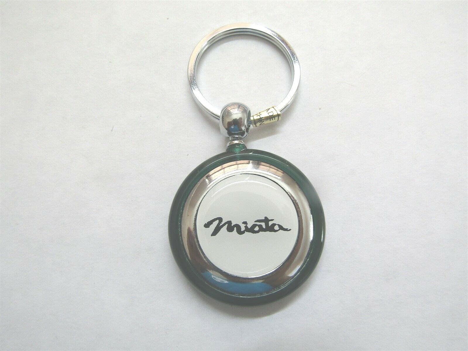 1990's 2000's MIATA VINTAGE LOGO ROUND PLASTIC KEYCHAIN - GREEN