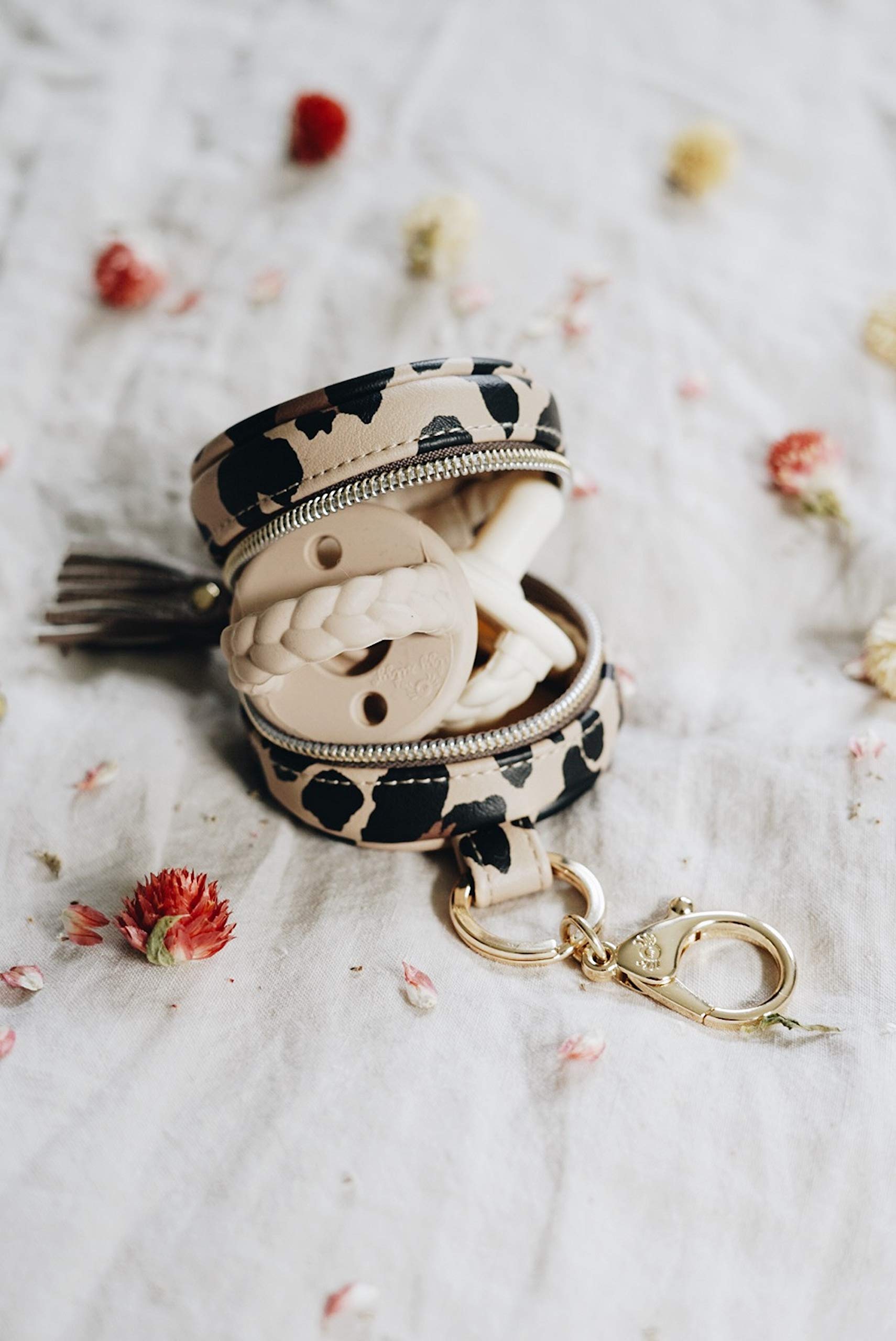 Itzy Ritzy Pacifier Holder Case with Clip - Pacifier Case Includes Clasp to Easily Attach to a Diaper Bag or Purse, Measures 2.5" in Diameter and Holds 2 Pacifiers (Leopard)