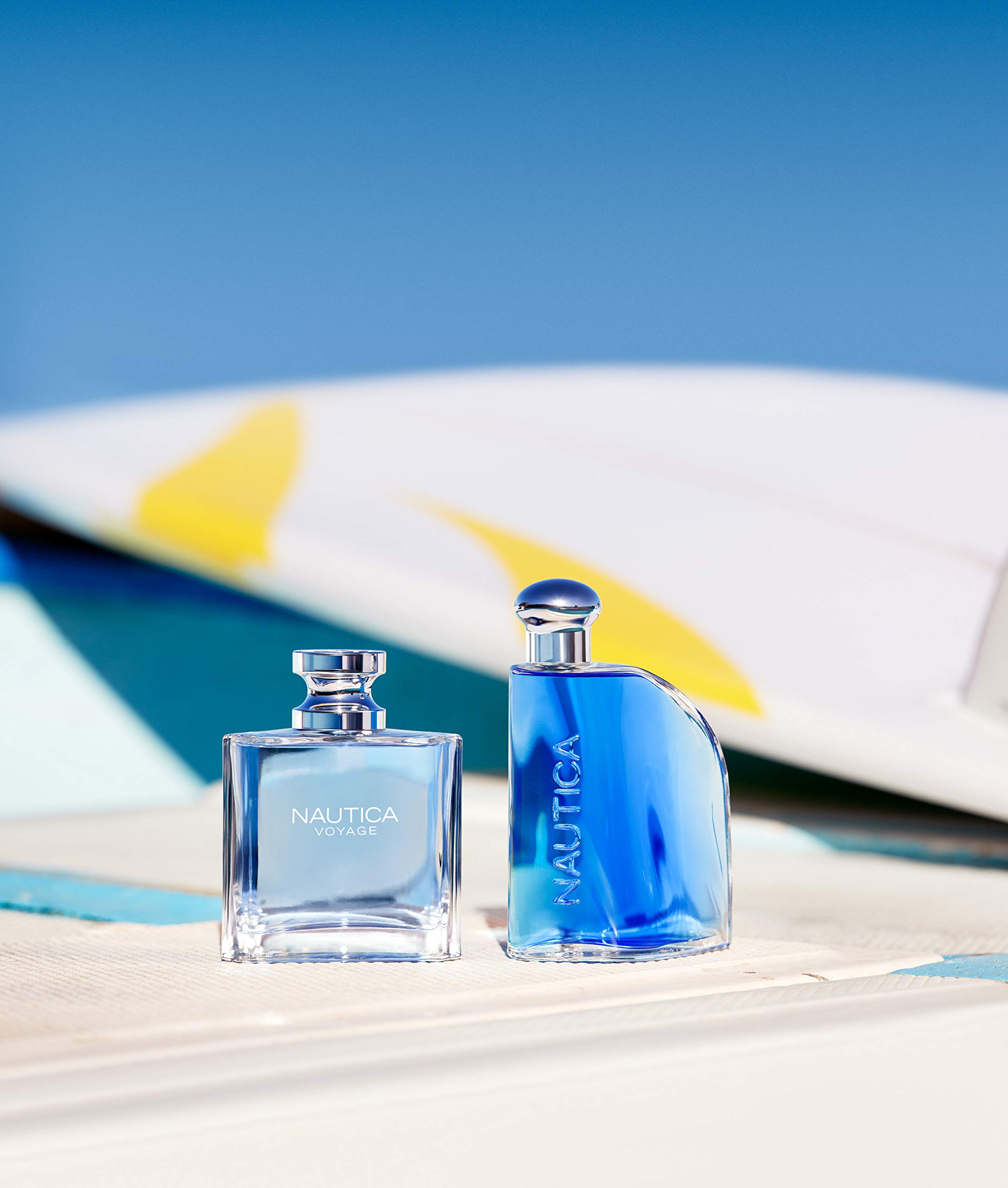 Nautica Voyage By Nautica For Men. Eau De Toilette Spray 3.4 Fl Oz and Nautica Blue Sail 1.6 Ounce Eau De Toilette Spray for Men