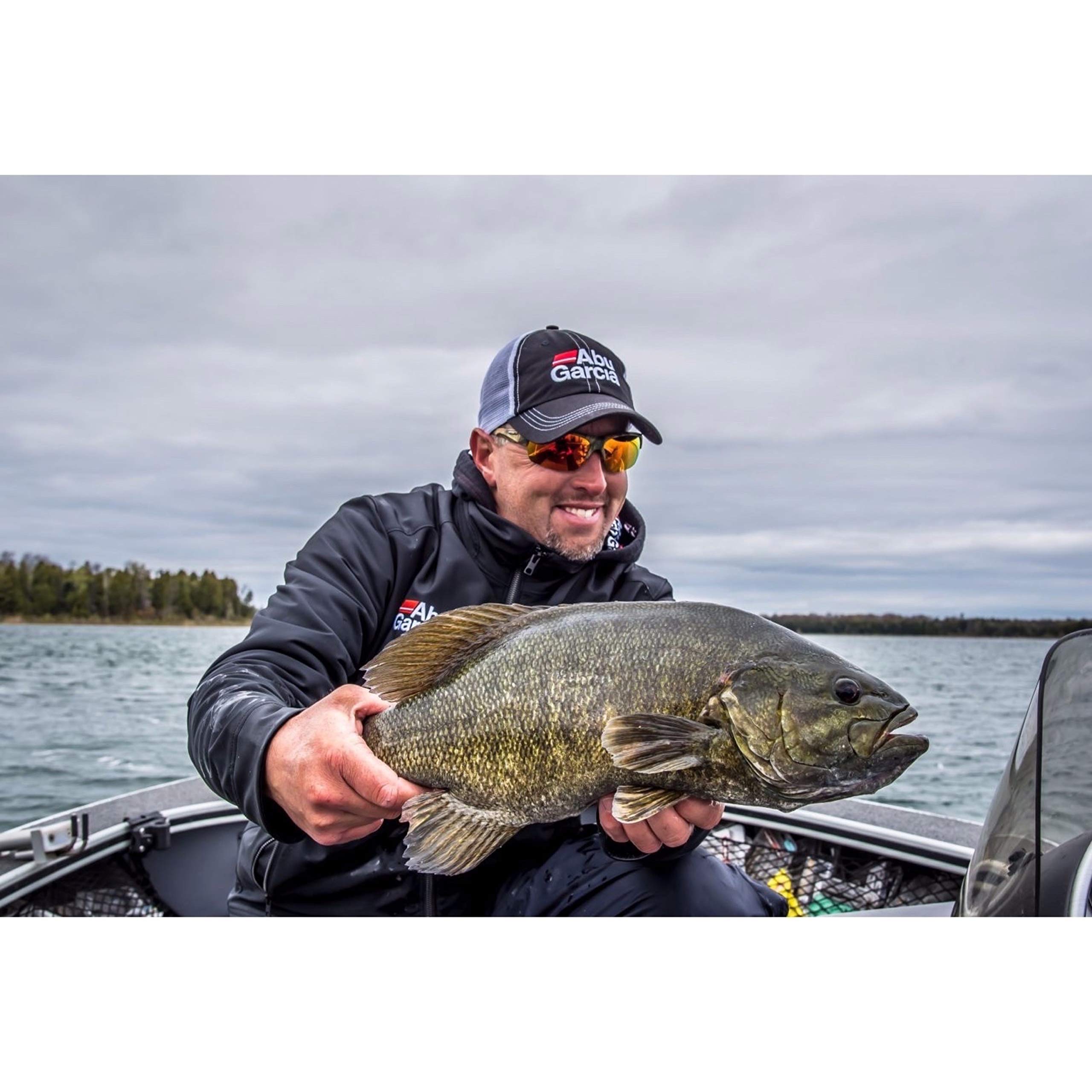 Abu Garcia Revo X Low Profile Baitcast Reel, Size LP (1430435), 7 Stainless Steel Ball Bearings + 1 DuraClutch Roller Bearing, Strong and Lightweight