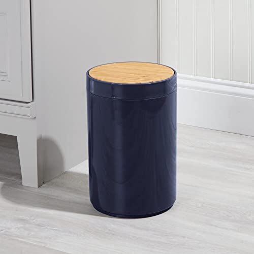 mDesign Plastic Round Trash Can Small Wastebasket, Garbage Bin Container with Swing-Close Lid, Kitchen, Bathroom, Home Office, Bedroom Basket; Holds Waste, Recycling,1.3 Gallon -Navy Blue/Natural