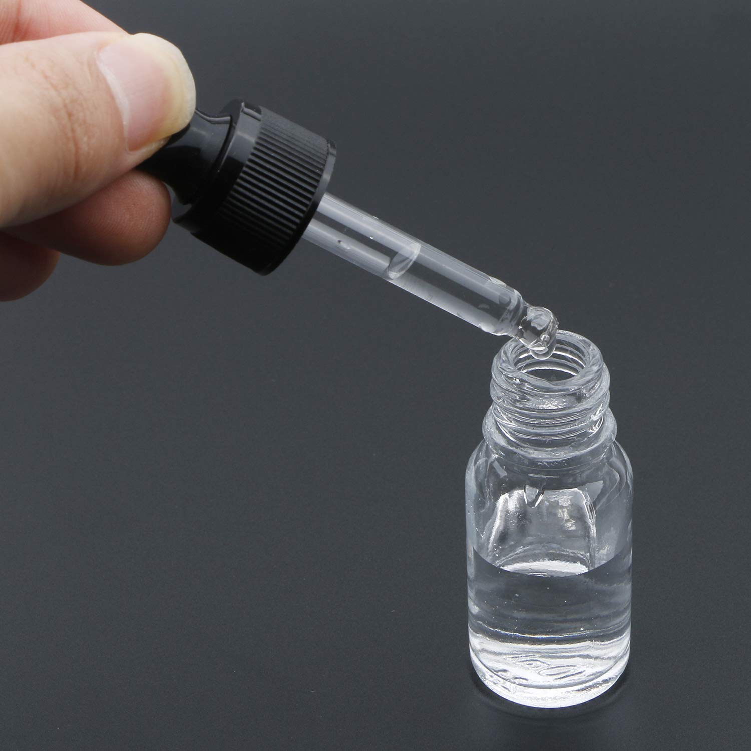 Kesell 8Pcs Glass Dropper Bottle Black Plastic Head Essential Oil Dropper Bottle 15ml Empty Refillable Clear Sample Storage Containers Vials, with Tapered Glass Droppers Black Screw Cap