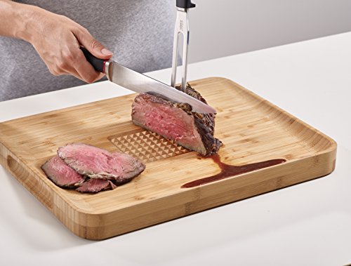 Joseph Joseph Cut & Carve Bamboo Cutting Board with Food Grip and Angled Surface Yellow Large
