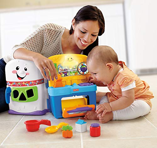 Fisher-Price Laugh & Learn Toddler Playset, Learning Kitchen with Music Lights & Bilingual Content for Baby to Toddler Pretend Play