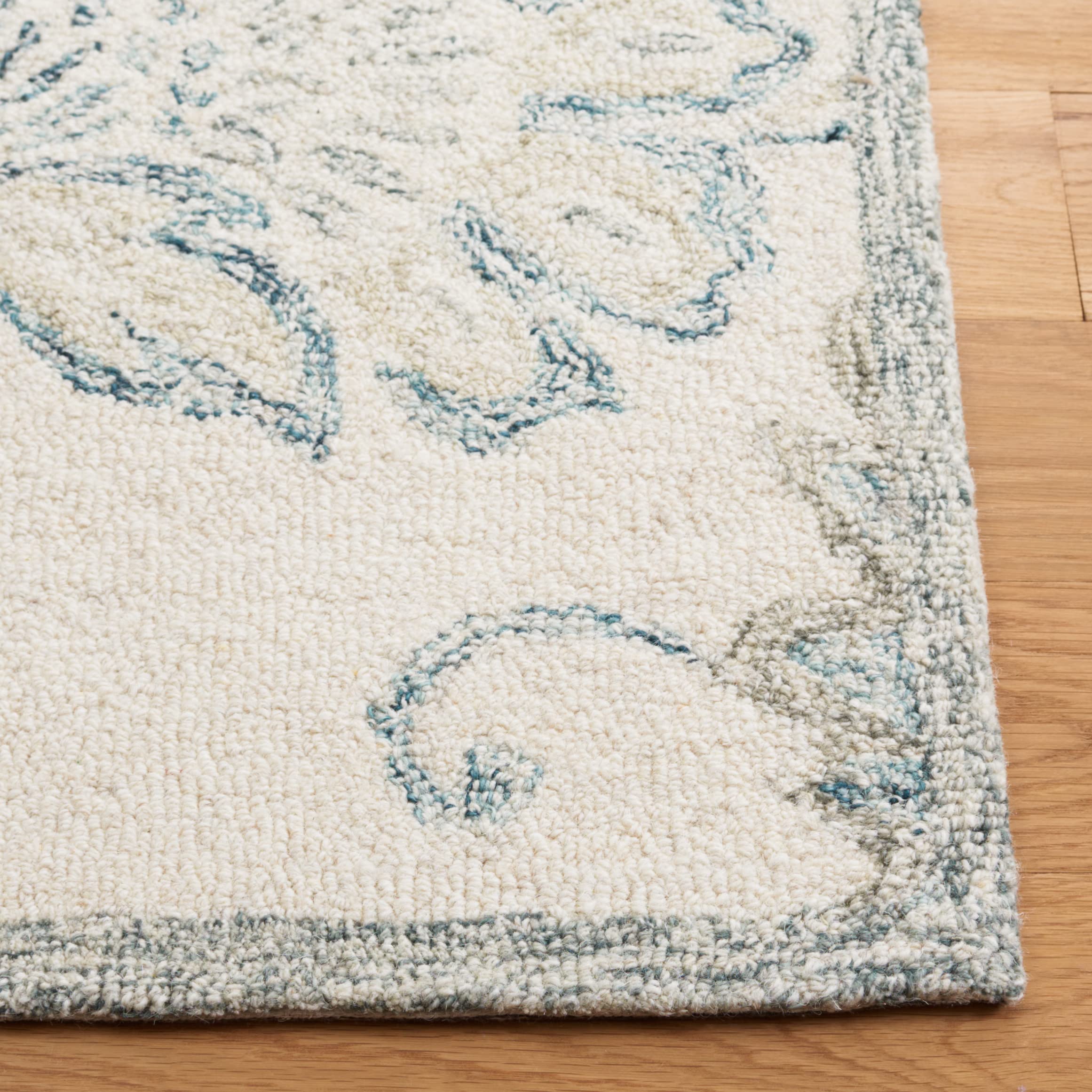 SAFAVIEH Micro-Loop Collection Area Rug - 5' x 8', Ivory & Blue, Handmade Floral Wool, Ideal for High Traffic Areas in Living Room, Bedroom (MLP477A)