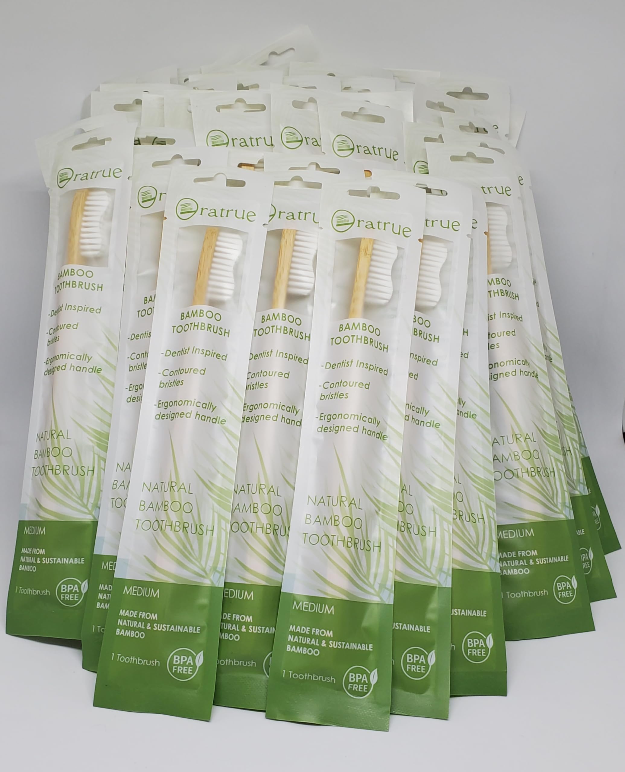 Oratrue Pack of 25 Bamboo Toothbrushes Medium Bristles US Company Packaged Individually Packaged Dentist Created UV Light Exposed