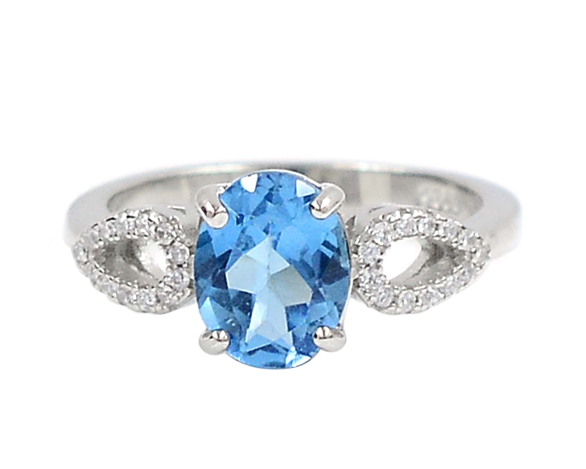 925 Sterling Silver Natural 9X7 MM Oval Cut Swiss Blue Topaz December Birthstone Solitaire Unisex Proposal Engagement Ring Wedding Jewelry Gift For Her (Rhodium Plated Silver, 7.5)