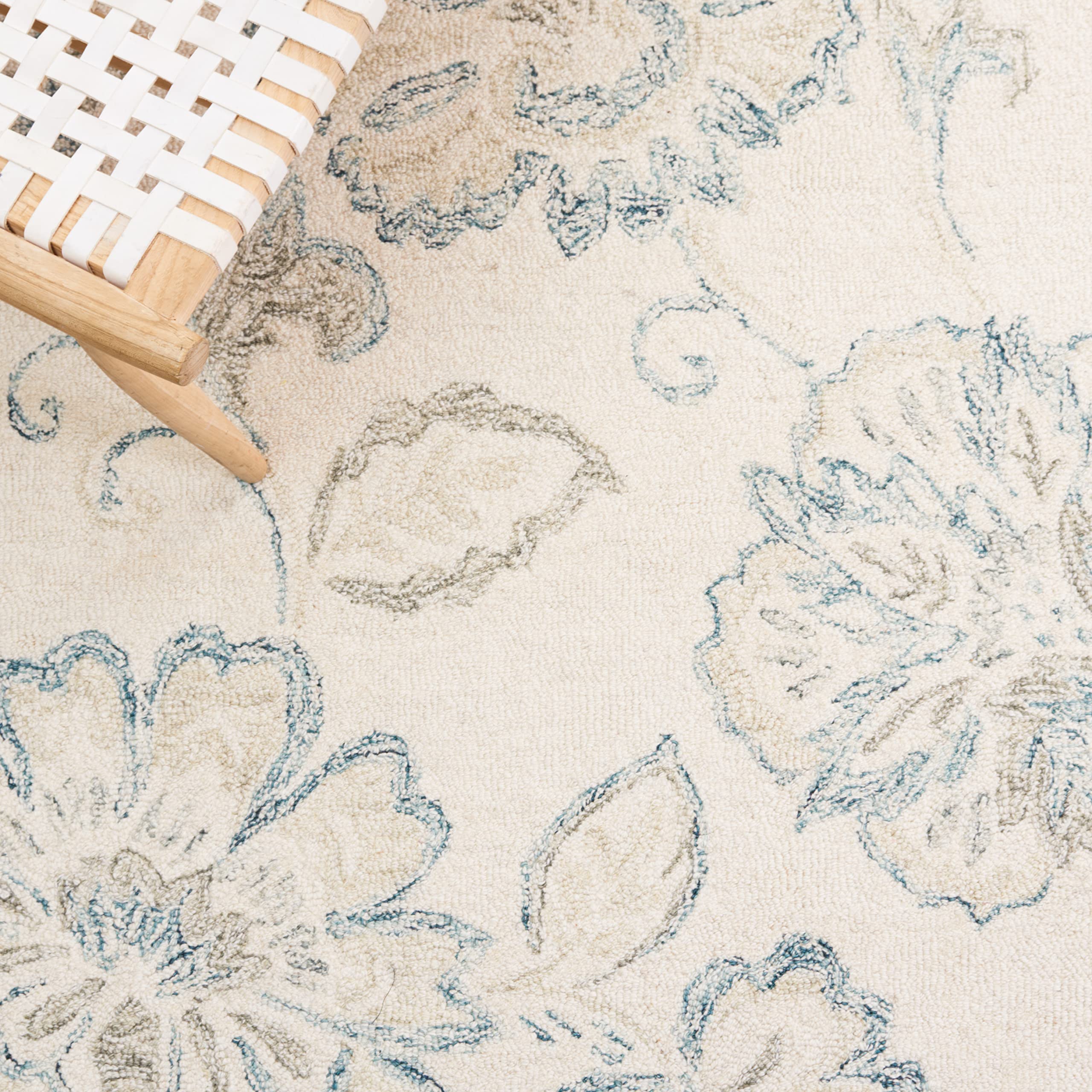 SAFAVIEH Micro-Loop Collection Area Rug - 5' x 8', Ivory & Blue, Handmade Floral Wool, Ideal for High Traffic Areas in Living Room, Bedroom (MLP477A)