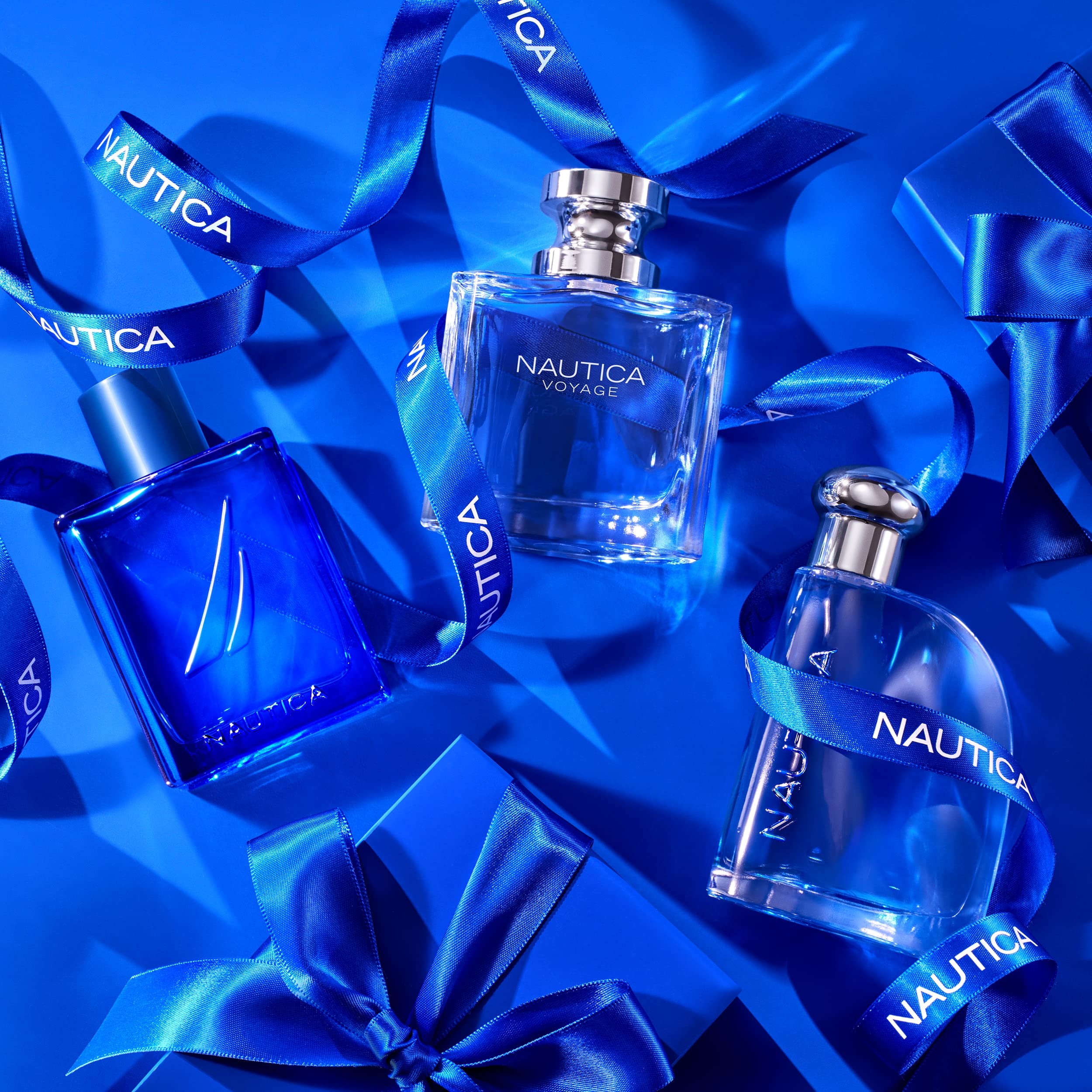 Nautica Voyage By Nautica For Men. Eau De Toilette Spray 3.4 Fl Oz and Nautica Blue Sail 1.6 Ounce Eau De Toilette Spray for Men