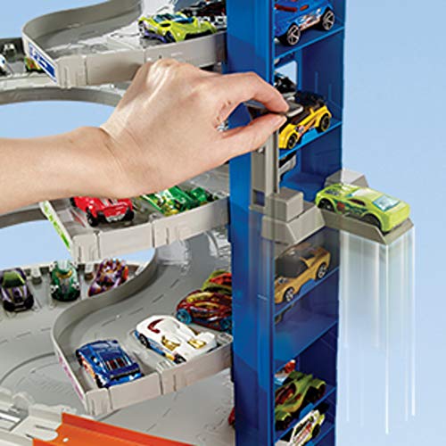 Hot Wheels Toy Car Track Set & 4 1:64 Scale Cars, Super Ultimate Garage, 3+ Ft Tall with Motorized Gorilla & Storage for 140 Cars