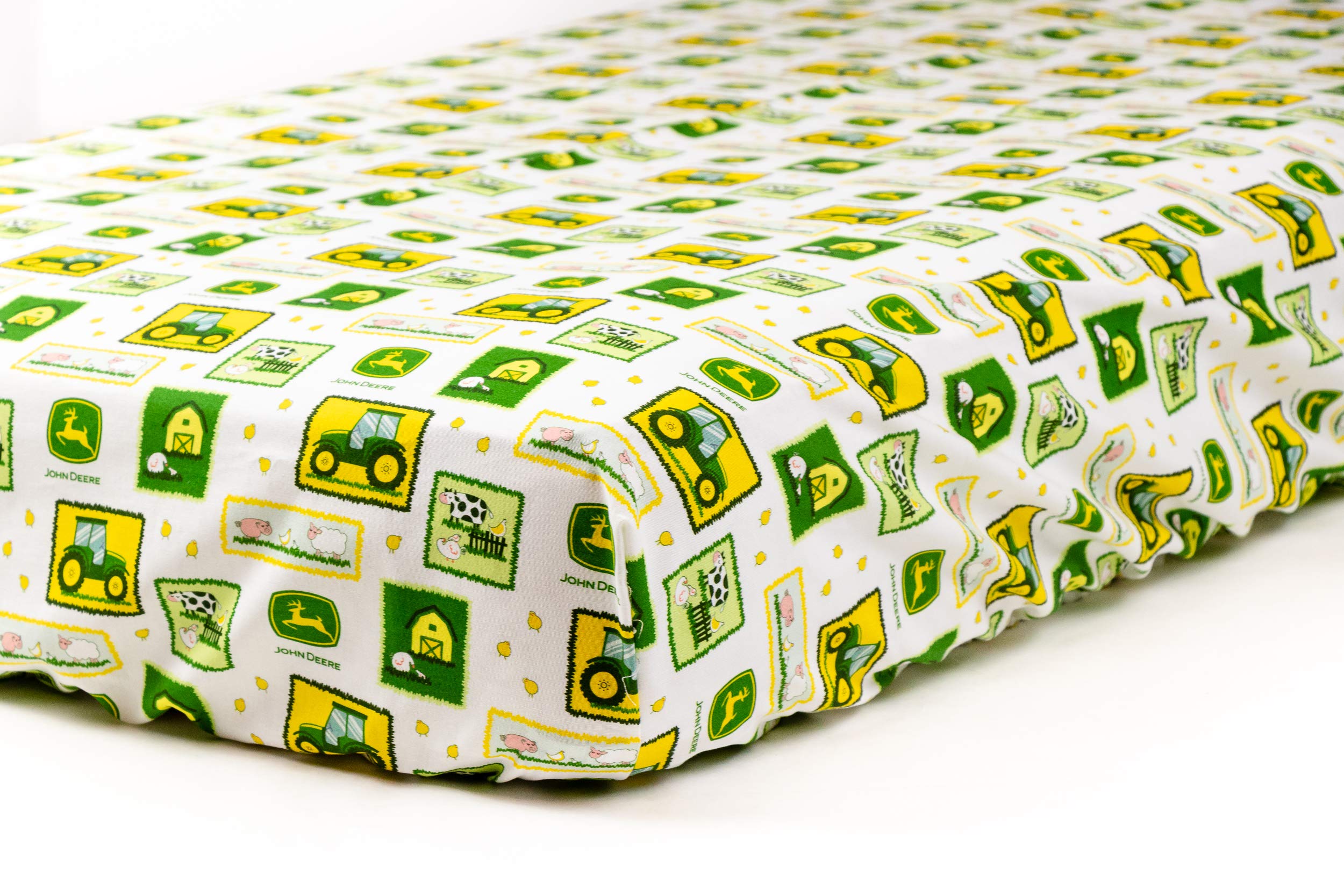 J&D Productions, Inc. Tractor Fitted Crib Sheet, displaying John Deere Tractors and Logos, Farm Animals, Green Plaid