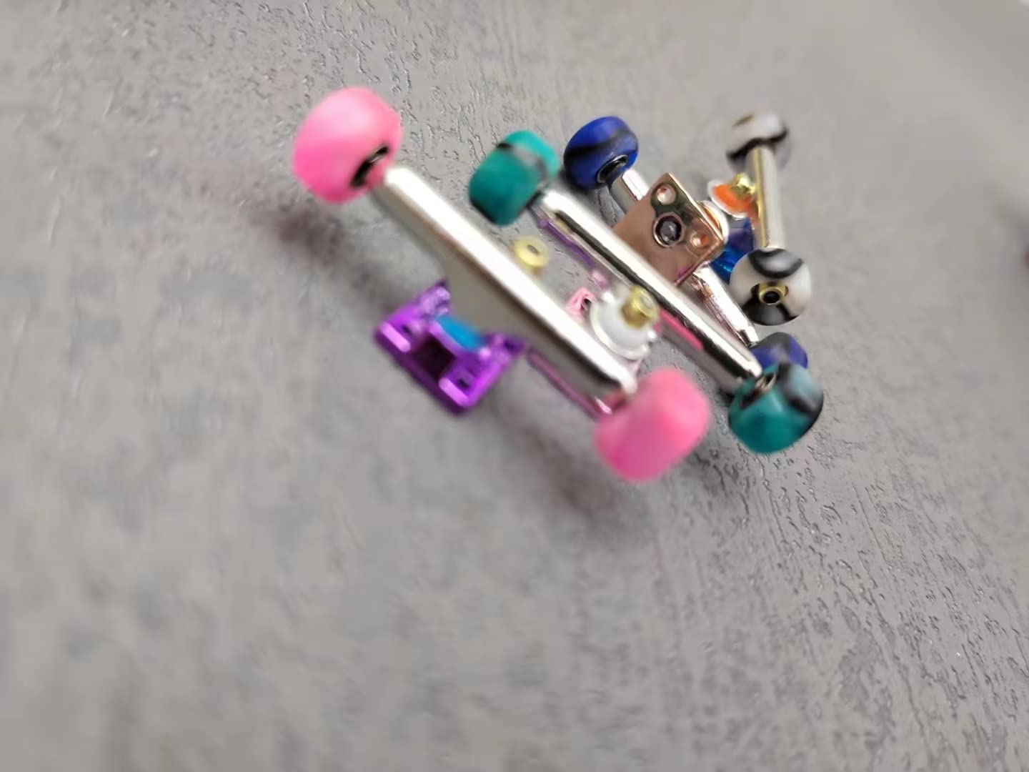 82A Urethane Fingerboard Wheels - New Street Shape, 4.5mm Width * 7mm Diameter- Ultra Spin Bearings - Grey & White Swirl Colorway (Pink)