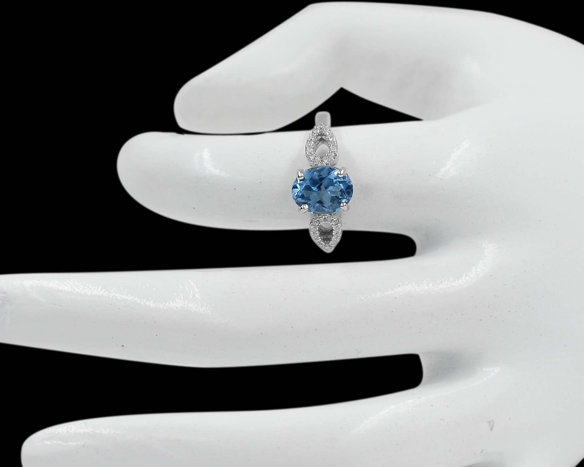 925 Sterling Silver Natural 9X7 MM Oval Cut Swiss Blue Topaz December Birthstone Solitaire Unisex Proposal Engagement Ring Wedding Jewelry Gift For Her (Rhodium Plated Silver, 7.5)