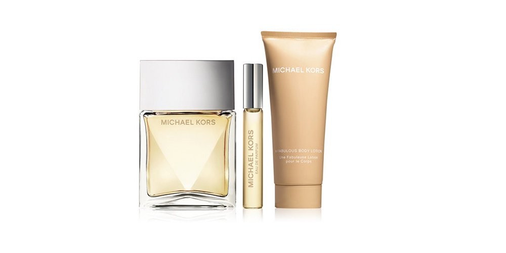 Michael Kors 3 Piece Set: 3.4 oz Eau de Parfum Spray + .34 oz Eau de Parfum Rollerball + 3.4 oz A Fabulous Body Lotion