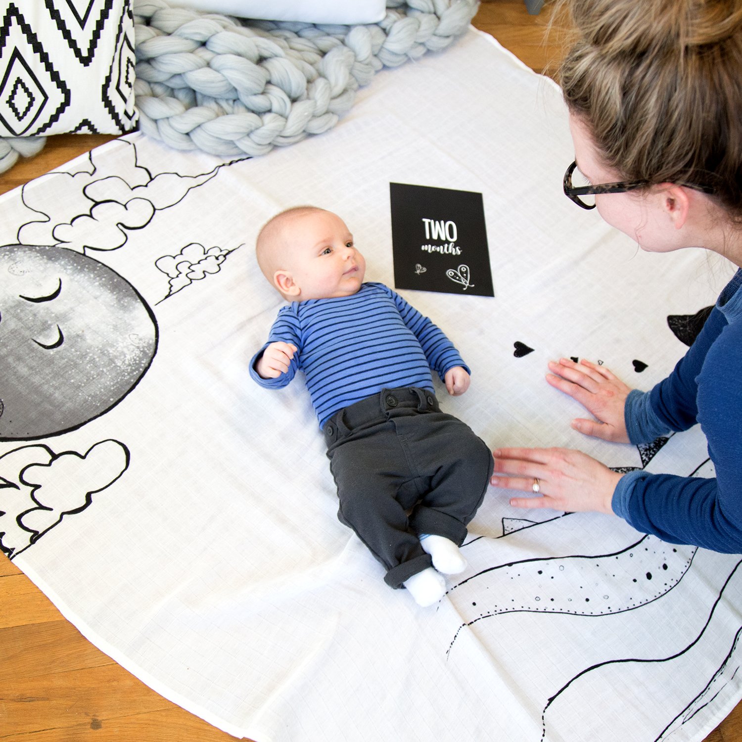 JumpOff Jo - Baby Blanket Swaddle, Hypoallergenic, 100% Cotton Baby Muslin Blanket with Original Storytelling Designs - 47" in. x 47" in. - Mama Bear Black