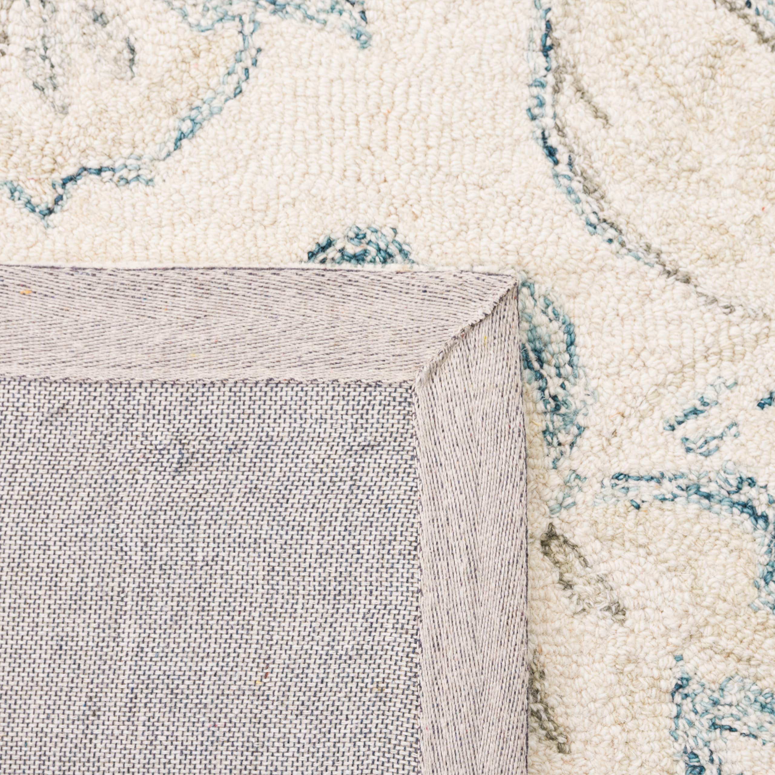 SAFAVIEH Micro-Loop Collection Area Rug - 5' x 8', Ivory & Blue, Handmade Floral Wool, Ideal for High Traffic Areas in Living Room, Bedroom (MLP477A)