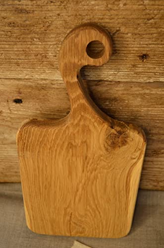 Rectangular wooden cutting board made of solid wood. Size: total length - 13.38 inches, width - 6.29 inches, thickness - 0.78 inches. The handle length is 4.72 inches.