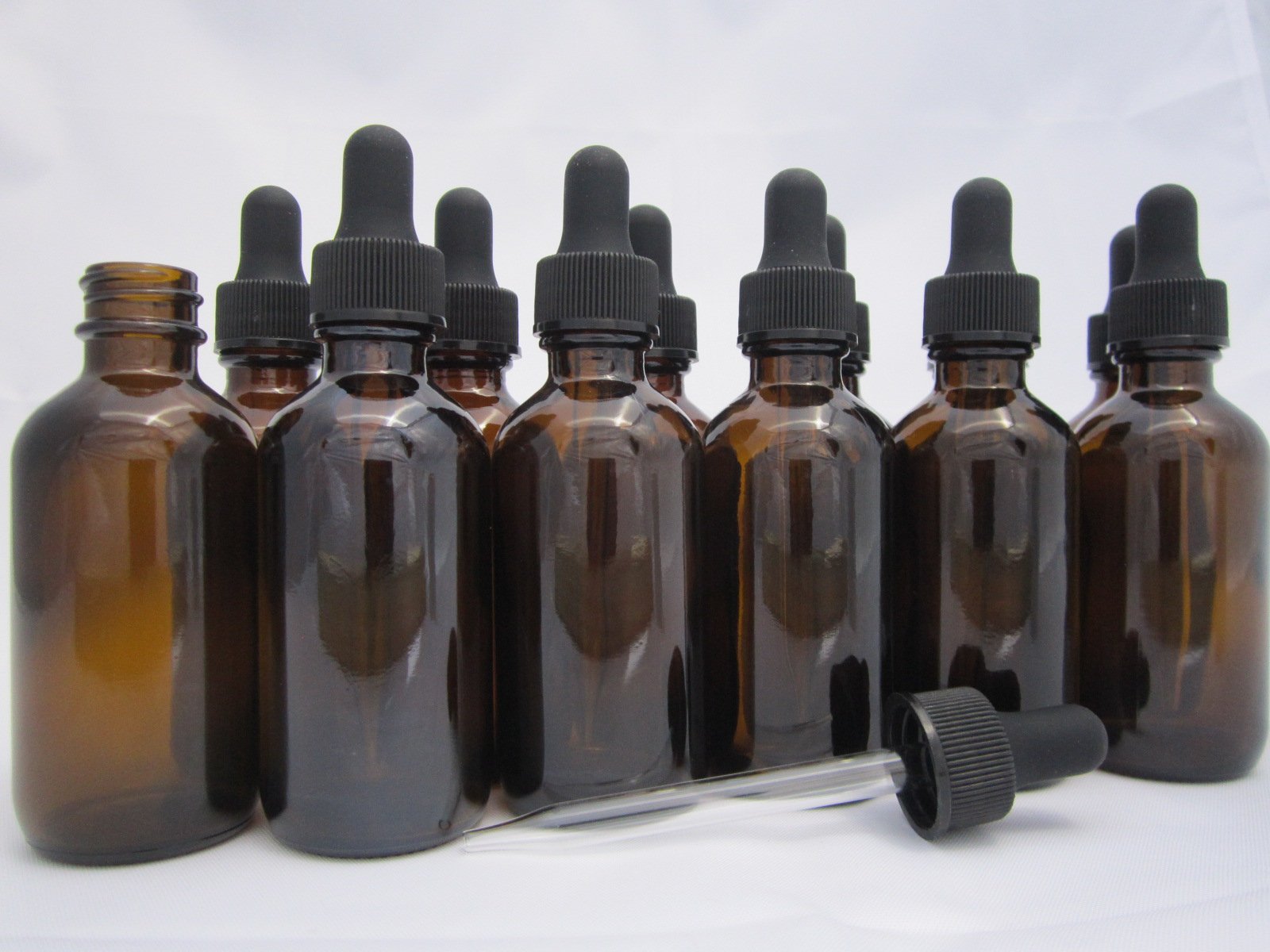 DropperStop™ 2oz Amber Glass Dropper Bottles (60mL) with Tapered Glass Droppers - Pack of 12