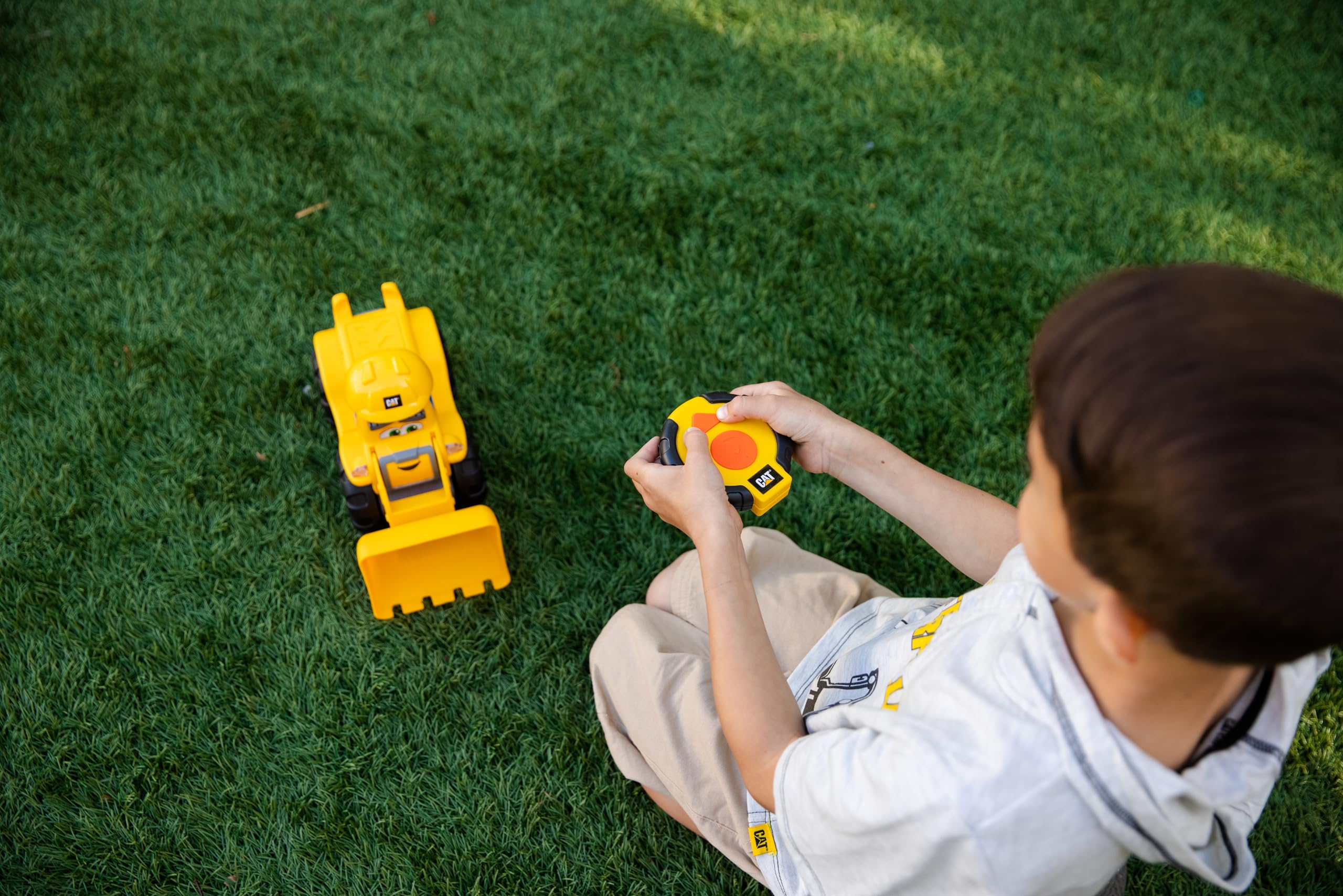 CAT Construction Toys, RC Remote Control Loader Truck - 10.5 Inch Length, Child Friendly Controller, Stowable Controller, Working Headlights - Batteries Included!