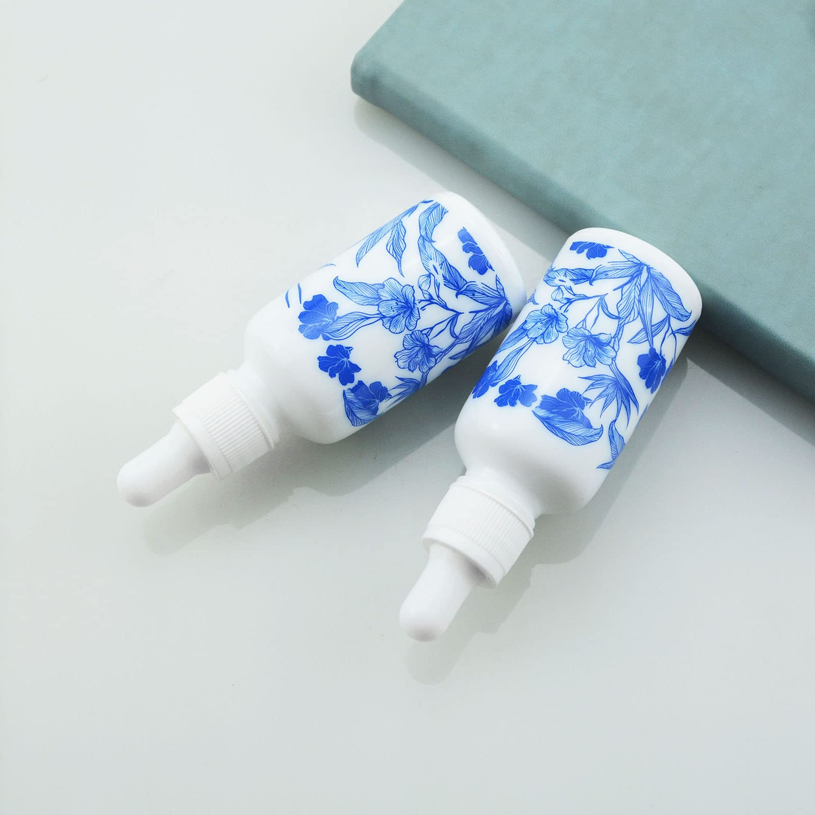 Wwolife 4 PCS 1 2/3oz (50ml) Blue and White Porcelain Ceramic Dropper Bottles Perfume Aromatherapy Cosmetic Container Essential Oils Sample Empty Dropper Bottles with Funnel Include
