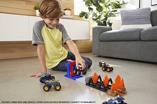 Hot Wheels Monster Trucks Fire Through Playset with 1:64 Scale Die-Cast 5-Alarm Toy Truck, Launcher & Spinning Flames