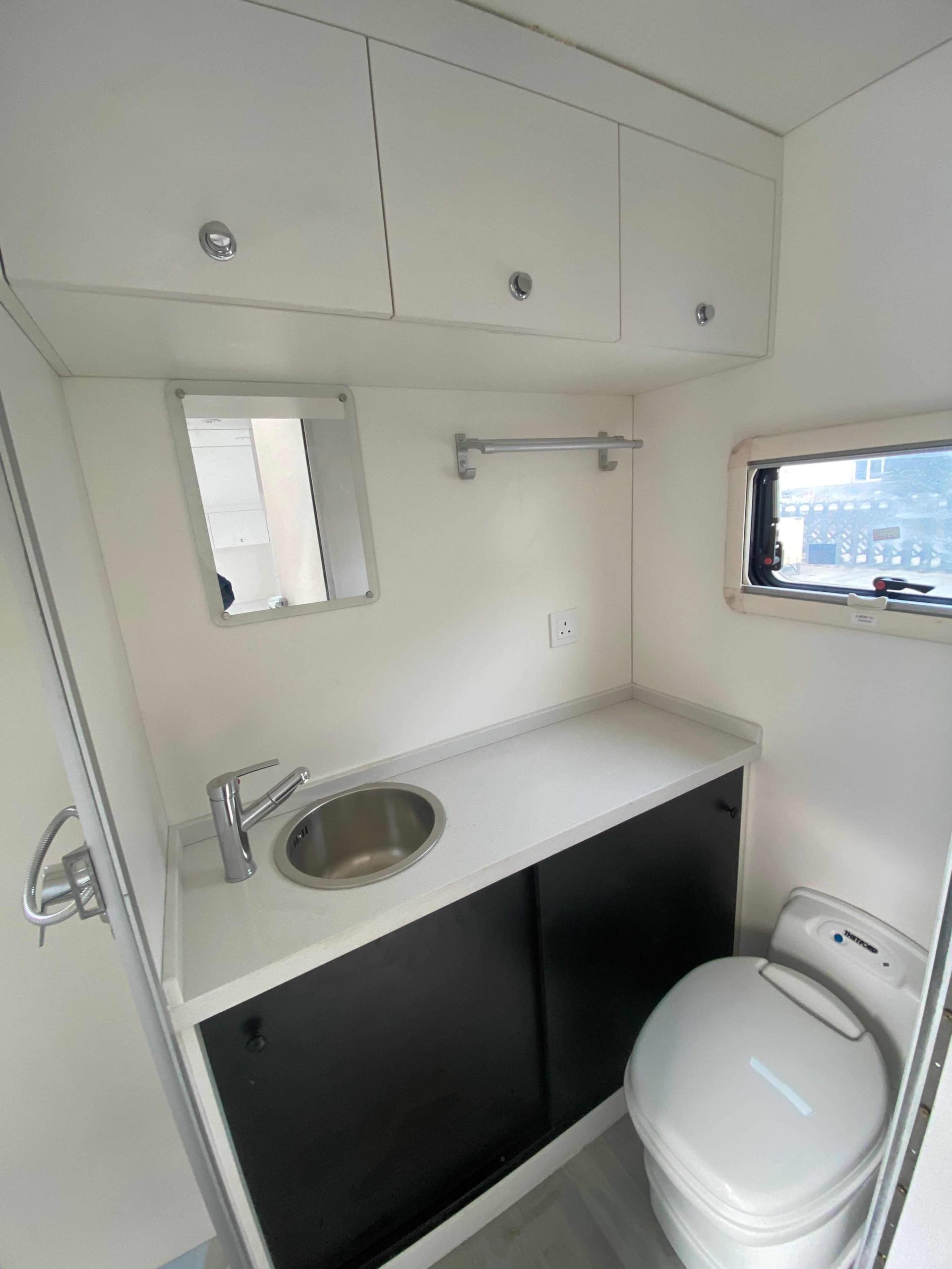 Offroad Caravans Trailer with Bedroom/Living Room/Bathroom and Kitchen.White and Black Color.