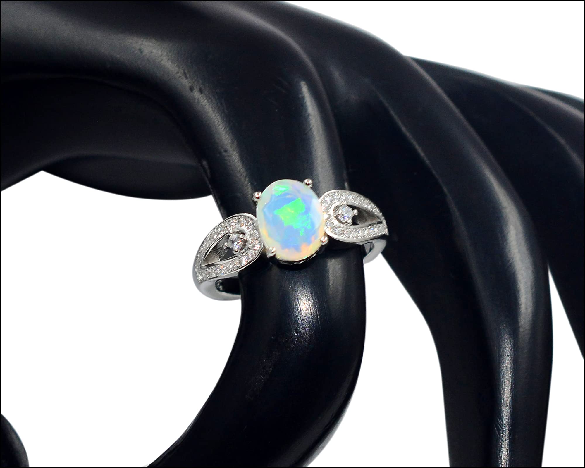 925 Sterling Silver Natural Ethiopian Welo Cut Opal 9X7 MM Oval October Birthstone Solitaire Unisex Proposal Ring For Engagement Gift (Rhodium Plated Silver, 7.5)