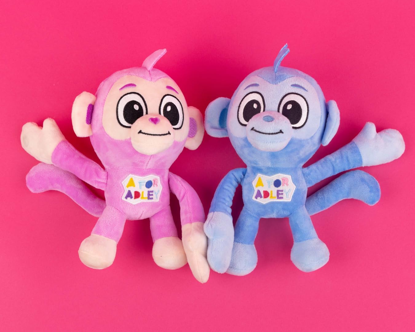 A FOR ADLEY Official Merch Monkey Buddies, A Pink and Blue Monkey Ready to Be Your Favorite Stuffed Animal Friend. Comes with Carrying Bag.