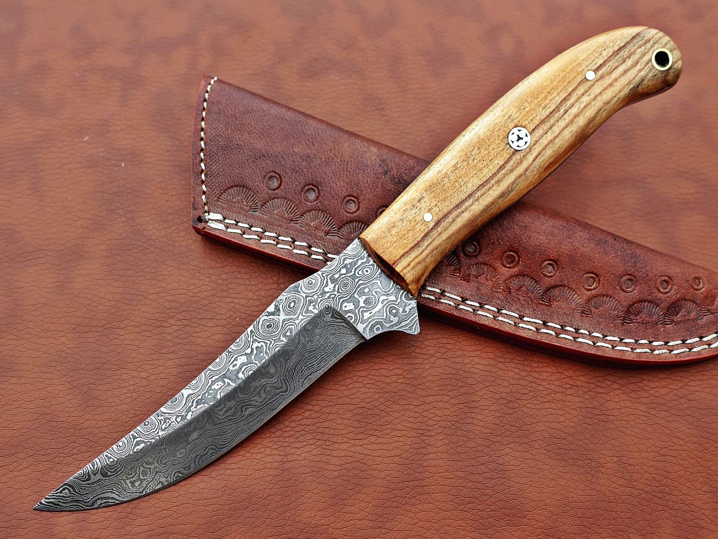 9" Long hand forged rain drop pattern Trailing point Damascus steel full tang blade Skinning Knife, Red colored wood scale with inserting hole, Cow hide Leather sheath included (Red wood)