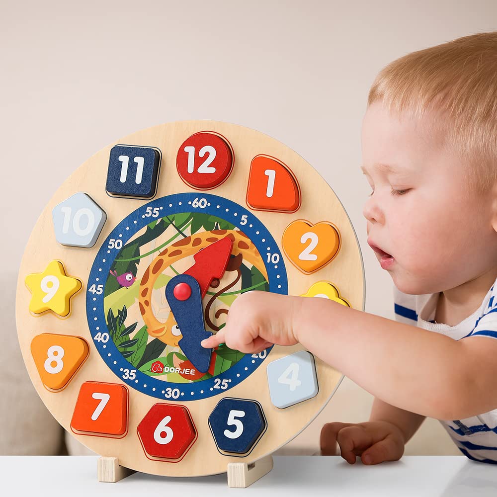 Dorjee Shape Sorter Teaching Clock, Learning Time Clock for Kids , Montessori Toys with 12pcs Removable Number Blocks, Display Holder Included