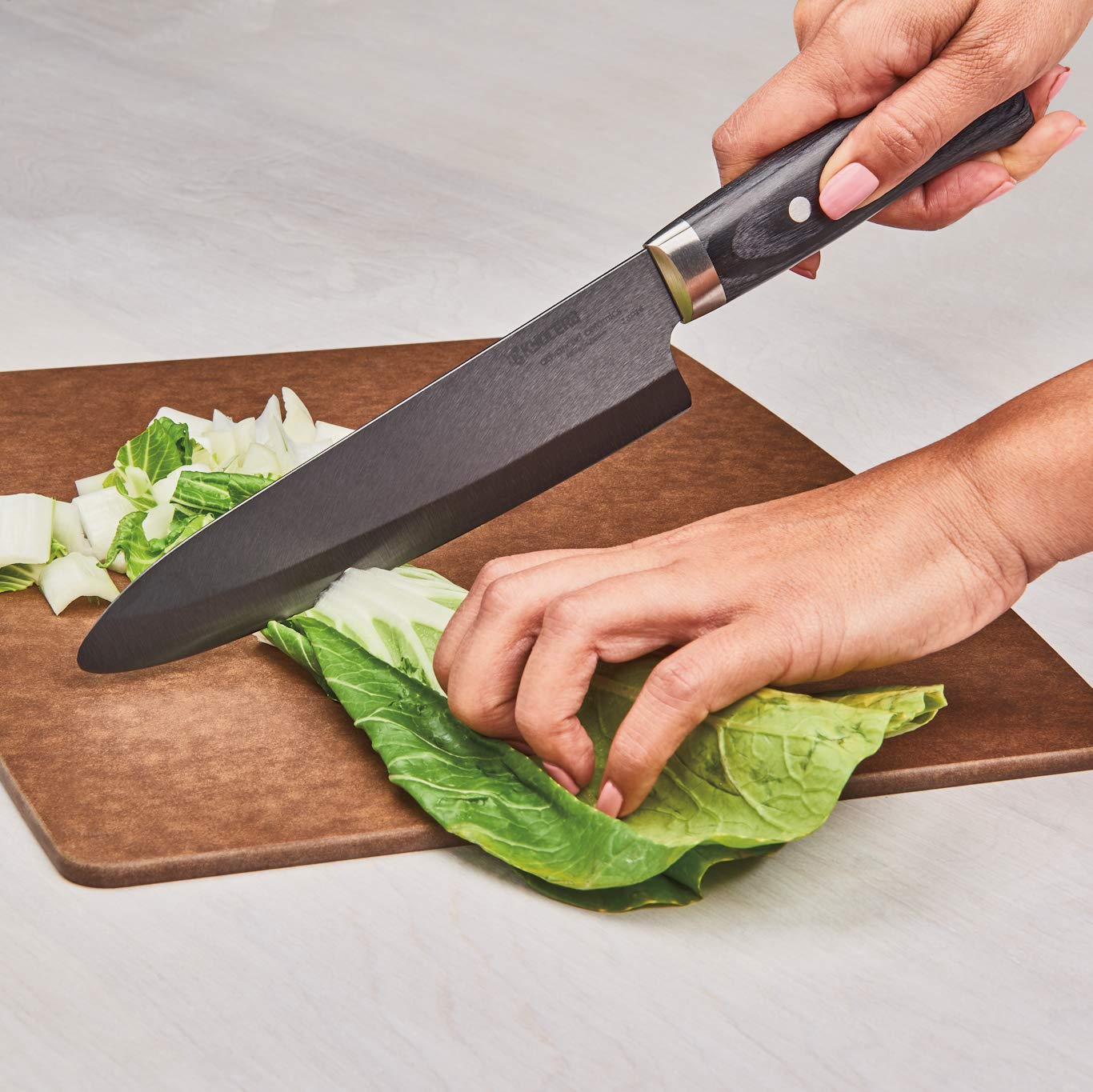 Kyocera Advanced Ceramic LTD Series Chef Knife with Handcrafted Pakka Wood Handle, 7-Inch, Black Blade