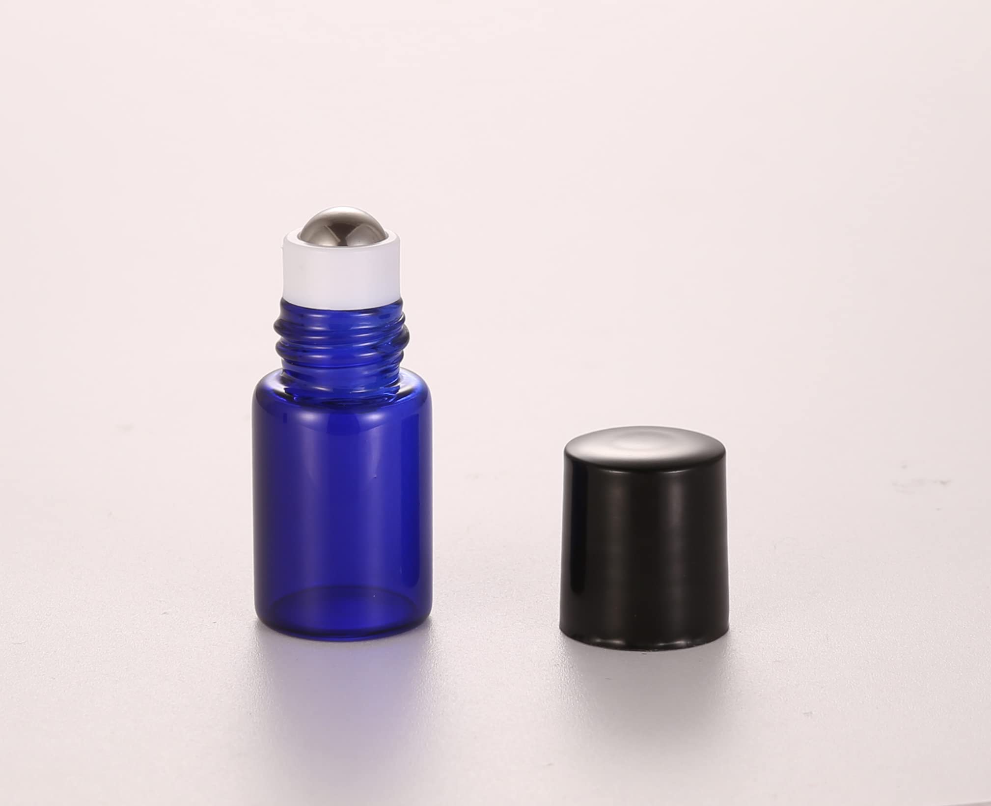 ZbFwmx 20 Pack Set 2ML(5/8 Dram) Micro Mini Glass Roll on Glass Bottles with Metal Roller Balls Refillable Slim Sample Vial Aromatherapy Essential Oil Roll On(2ML Blue)