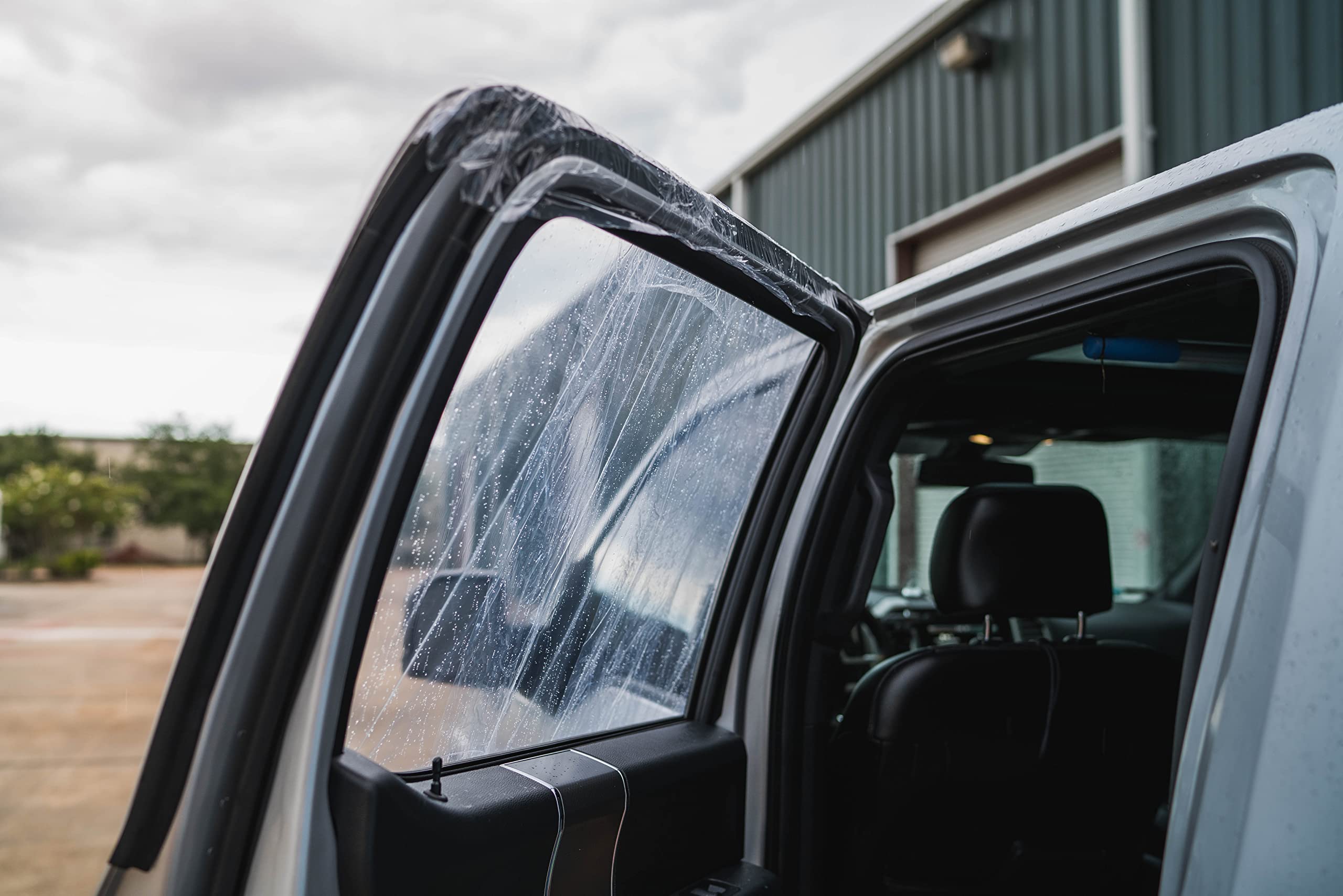 Big Tape Window Plastic Barrier Film β 2 Pack of 12 Feet XL Roll of Plastic for Windows β 17.5 Inch Wide Car Tape for Broken Windows β Waterproof, No Sticky Residue β Easy DIY Installation.