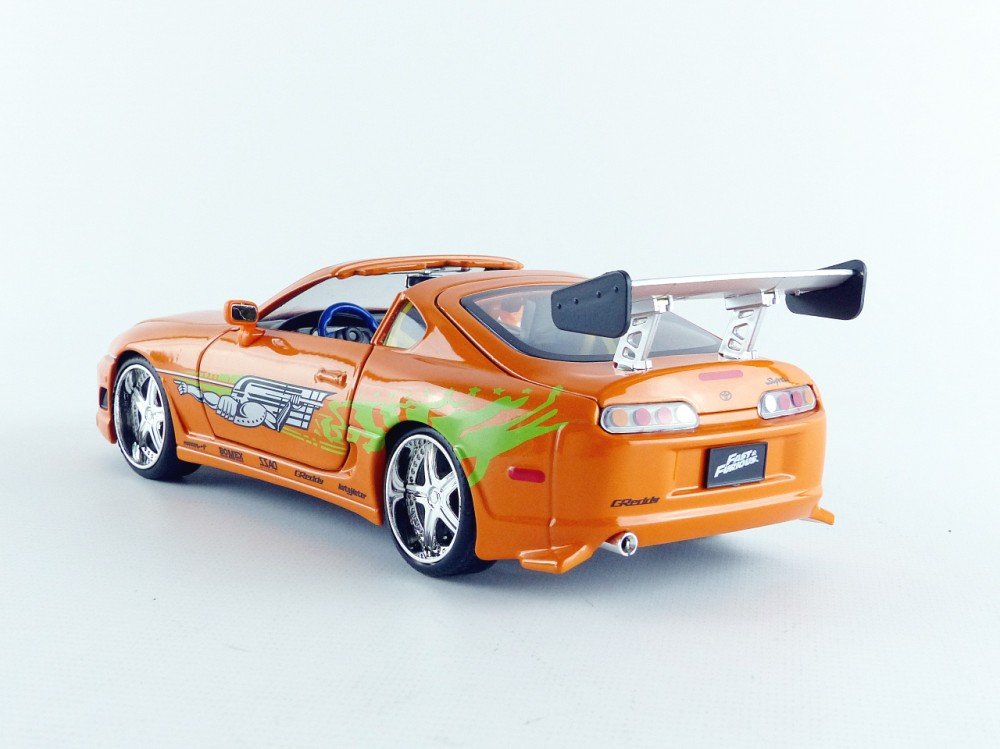 Jada Fast & Furious Coche Nissan Skyline Gt R R34 2002, Escala 1:24 + A Todo Gas Vehículo 1/24 1995 Toyota Supra