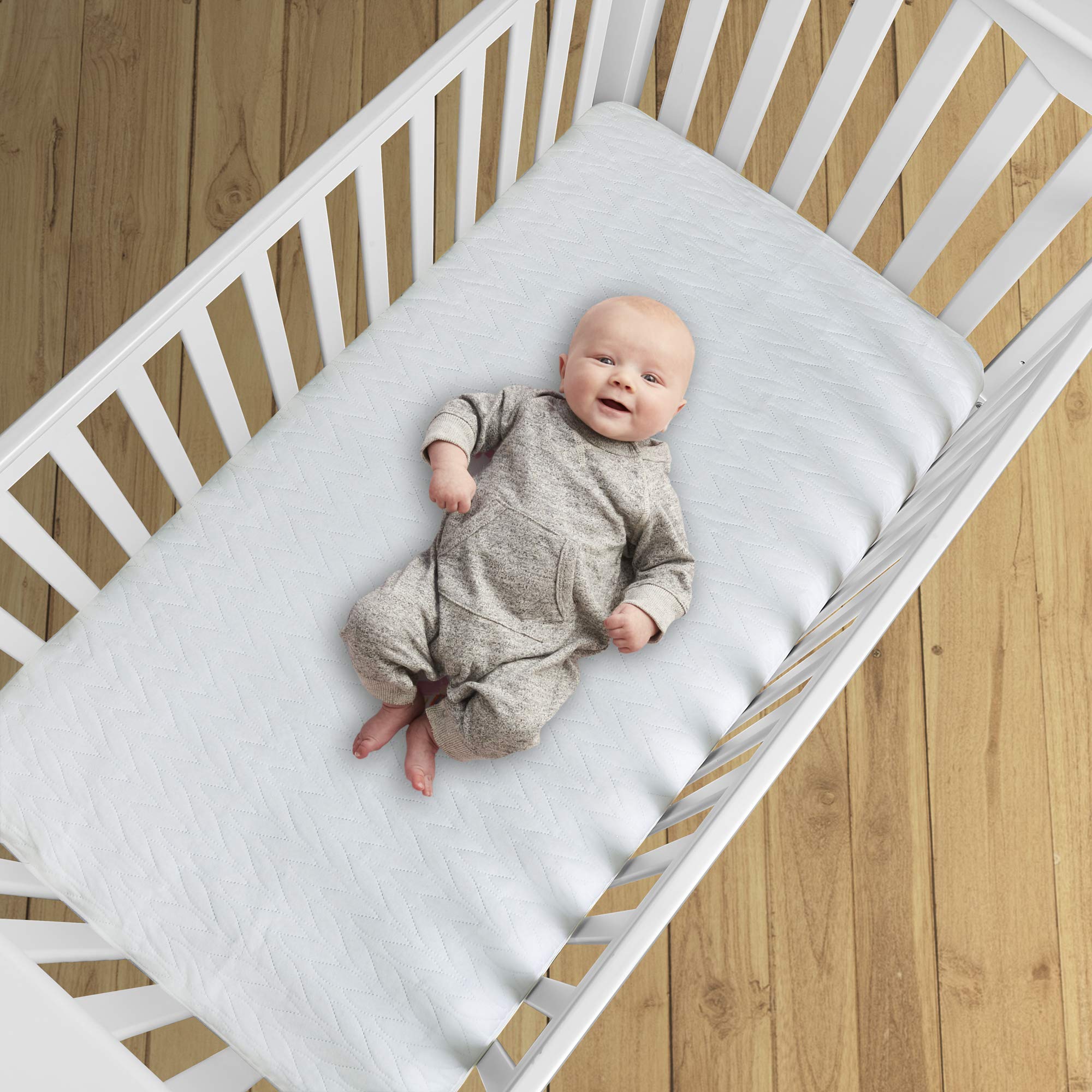 BreathableBaby Waterproof Crib Mattress Pad — Fits Full-Size Crib & Toddler Mattresses Measuring 52″ x 28″ (132.1 x 71.1 cm)