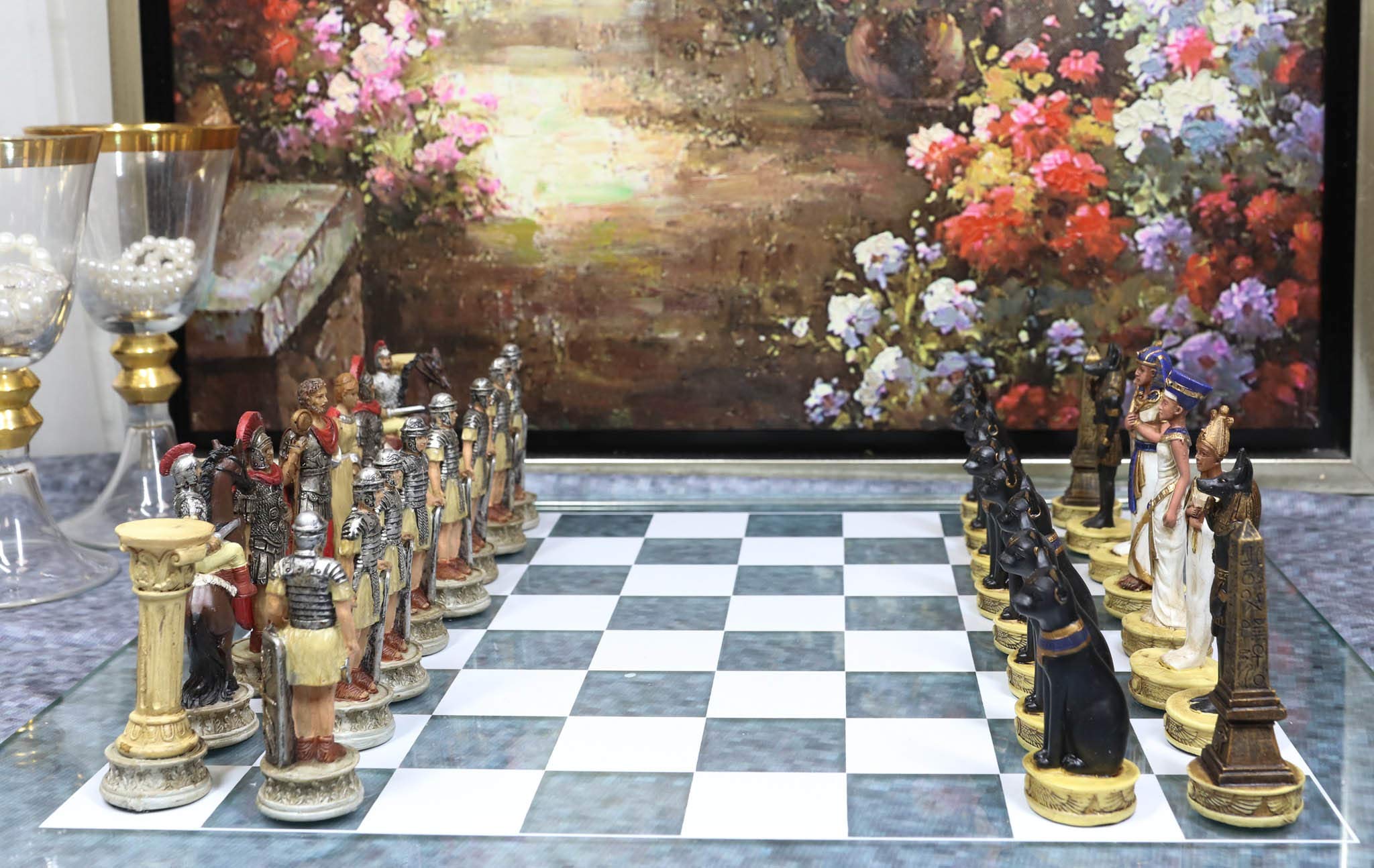 Ebros Gift Historical Themed Chess Set Egyptian Ptolemaic Pharaoh Army VS Augustus Caesar Roman Empire Centurions Resin Sculpted Chess Pieces with Checker Frosted Glass Board Gaming Set