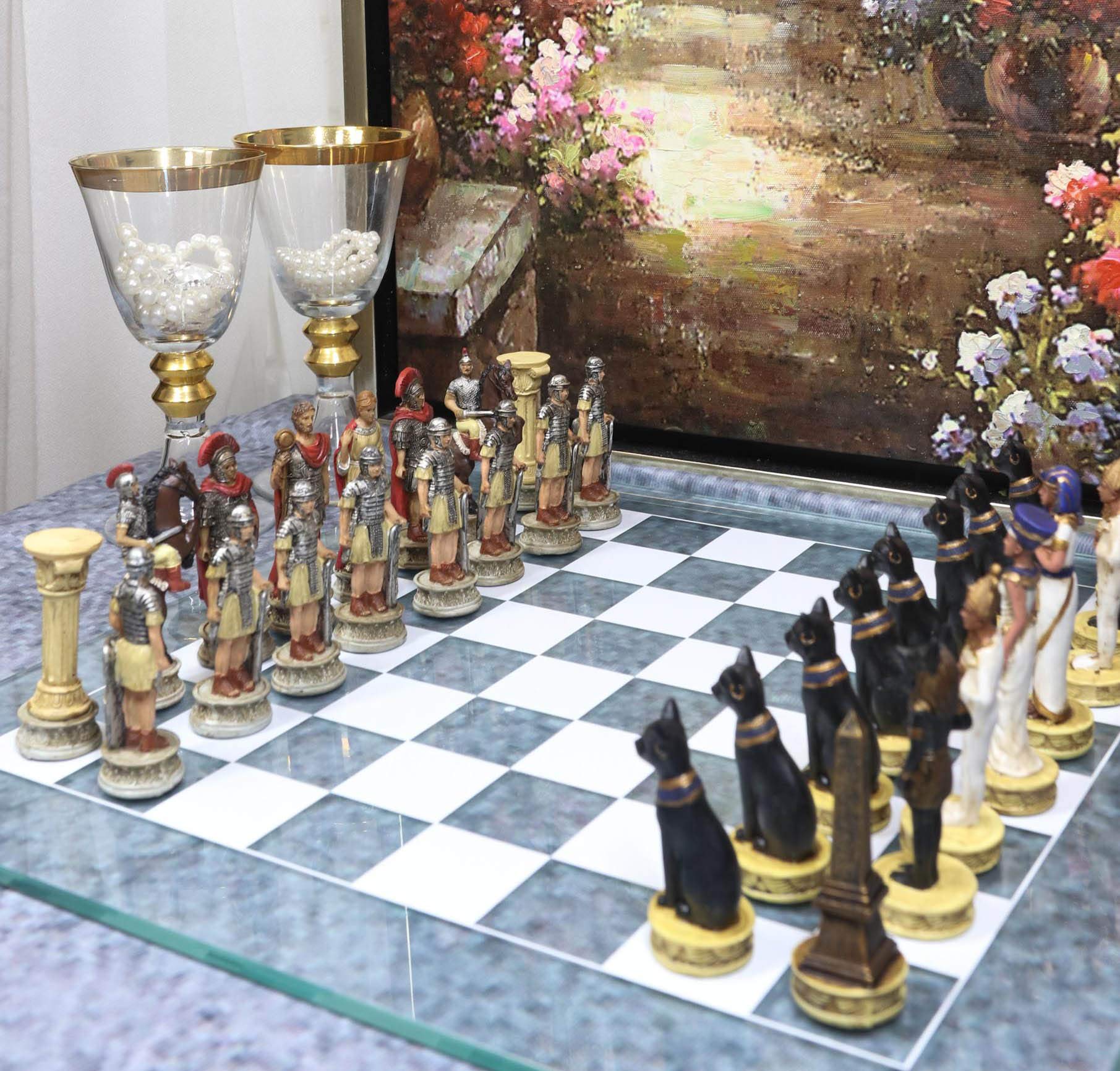 Ebros Gift Historical Themed Chess Set Egyptian Ptolemaic Pharaoh Army VS Augustus Caesar Roman Empire Centurions Resin Sculpted Chess Pieces with Checker Frosted Glass Board Gaming Set