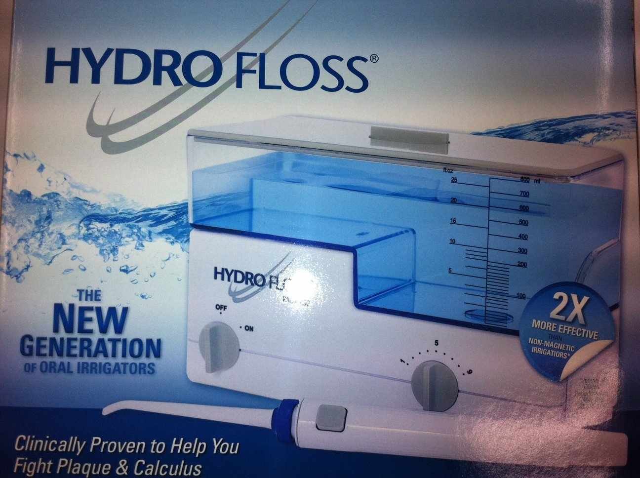 Hydro Floss Oral Irrigator Plus Book Bundled Package - 2 Items