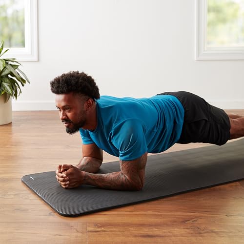 Amazon Basics Extra Thick Exercise Yoga Gym Floor Mat with Carrying Strap, 74 x 24 x .5 Inches, Black