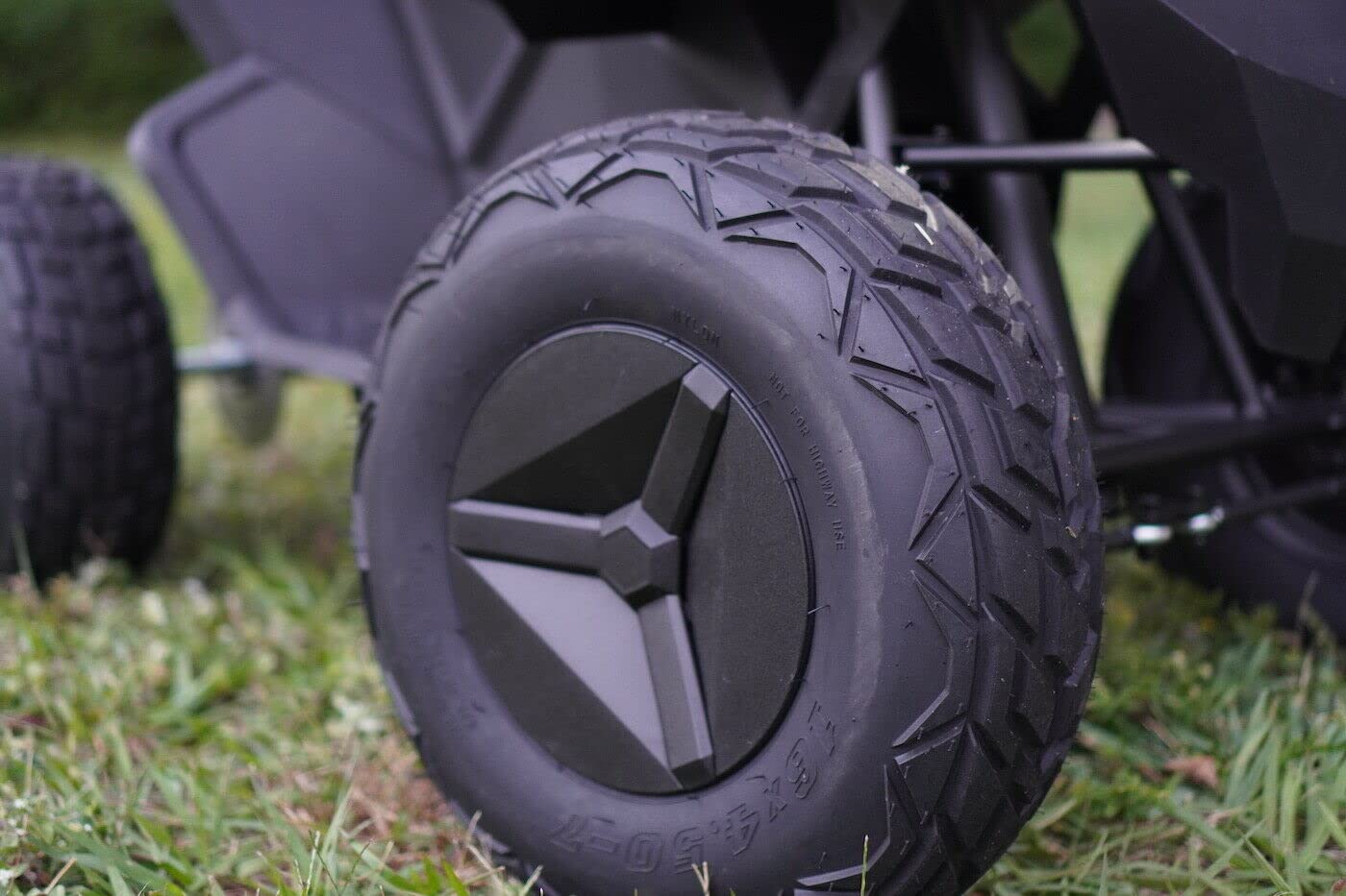 Tesla Brand Cyberquad for Kids, Four Wheel All Electric ATV, Ages 8+, 1 Year Limited Warranty, Top Speed 10 MPH, Range Up to 15 Miles, 36V Lithium Ion Battery and Charger Included, Black