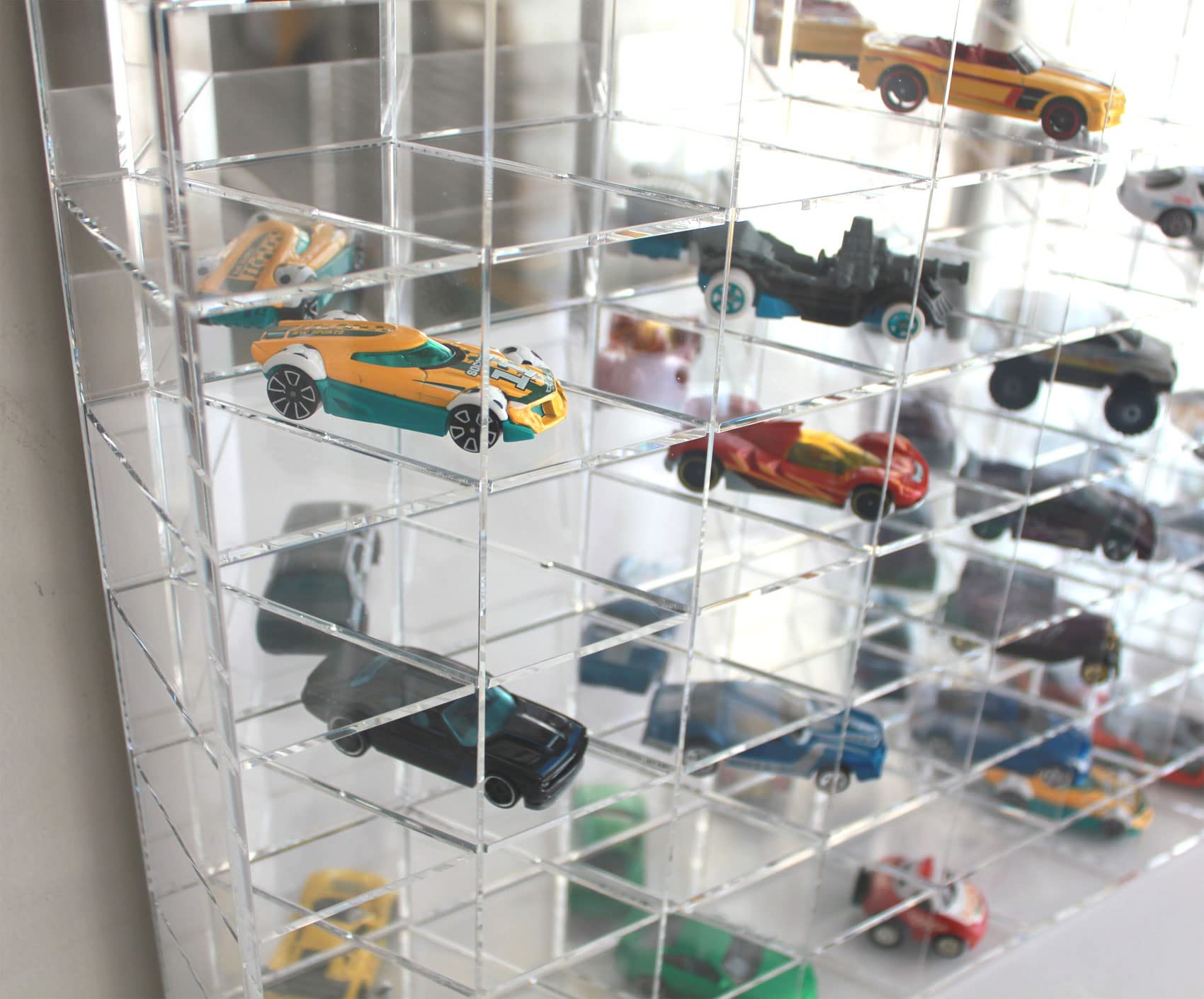 DisplayGifts Clear Acrylic Display Case for 1:64 Scale Hot Toy Cars Wheels Model Cars Display with 144 Compartments in 45 Degree Angle, Clear, UV Protect 22.5 X 30.4 X 3 Inches, Wall Mounted Storage