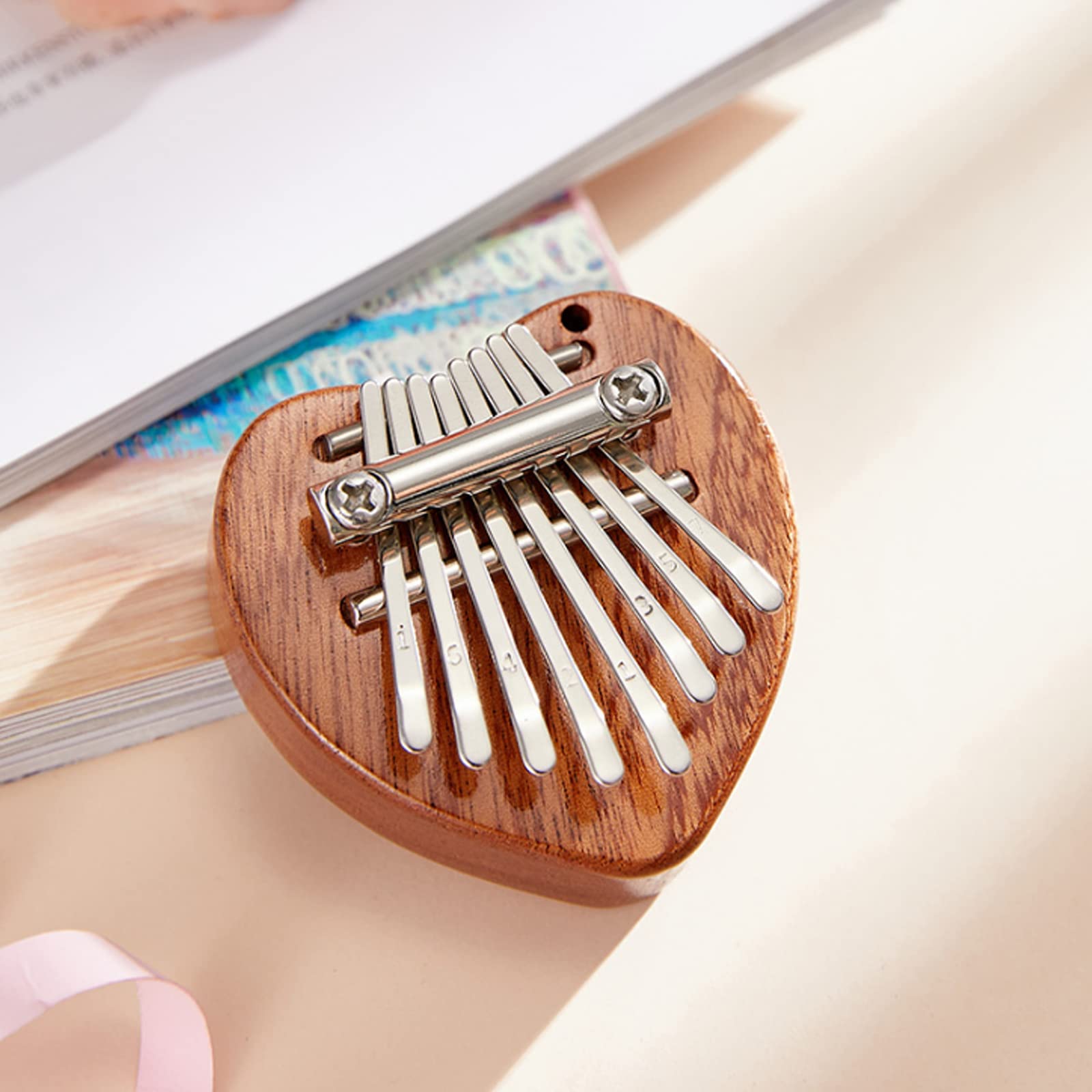 ANXVERS 8 Key Kalimba Thumb Piano,Mini Thumb Piano, Delicate Finger Piano, Heart-Shaped Finger Piano Decompression, Music Accessories, Pendant Gifts, Portable Mini Piano for Children and Beginners