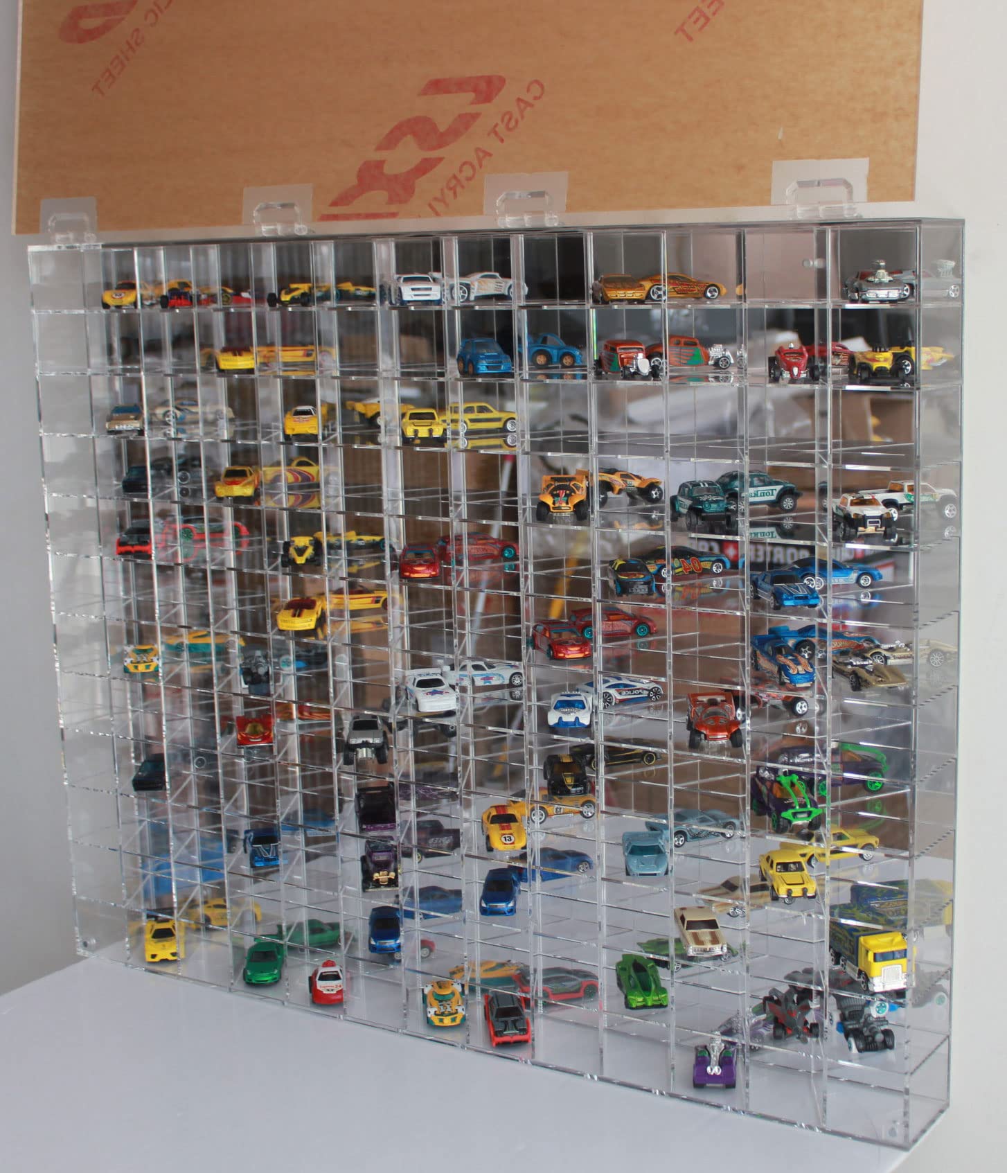 DisplayGifts Clear Acrylic Display Case for 1:64 Scale Hot Toy Cars Wheels Model Cars Display with 144 Compartments in 45 Degree Angle, Clear, UV Protect 22.5 X 30.4 X 3 Inches, Wall Mounted Storage