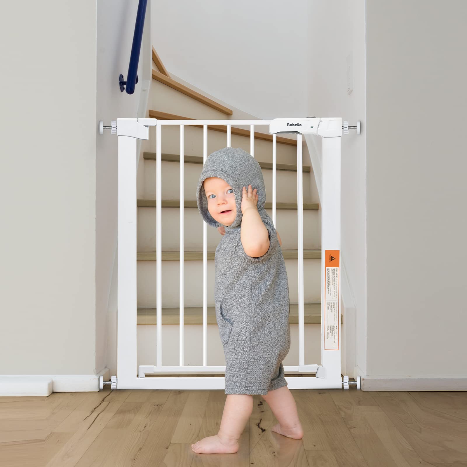 BABELIO 26-34.5 Inch Easy Install Narrow Pressure Mounted Metal Baby Gate, No Drilling, No Tools Required, with Wall Protectors and Extenders (White)